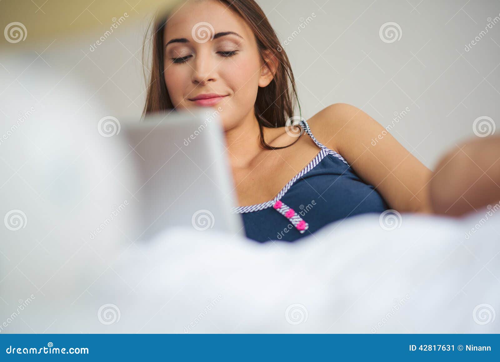 Typing on the Laptop in Bed Stock Image - Image of healthy, lying: 42817631