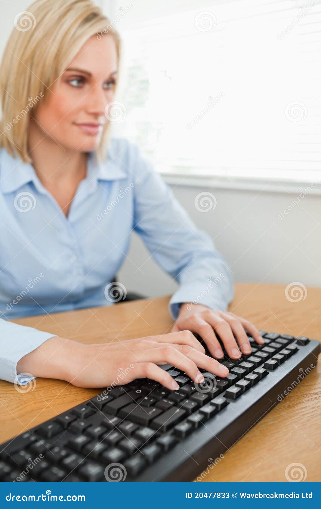 Typing Woman Looking at Screen Stock Image - Image of secretary, people ...