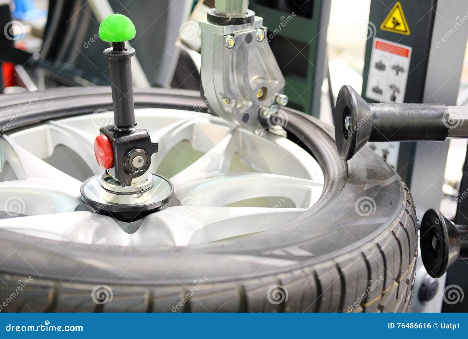 Tyre fitting machine stock photo. Image of mechanical - 76486616