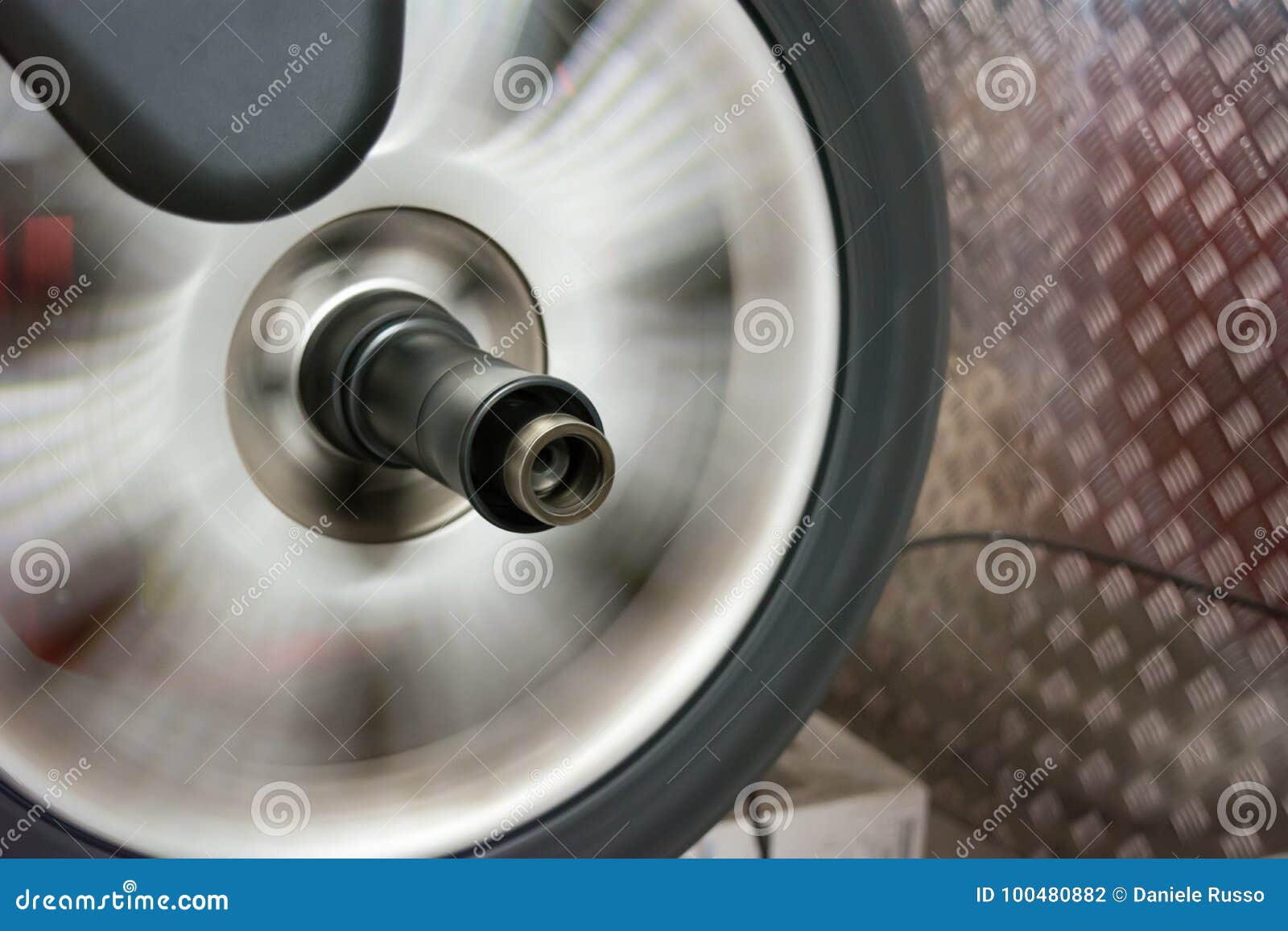 Tyre Spinning on the Balancing Machine Stock Photo - Image of male ...