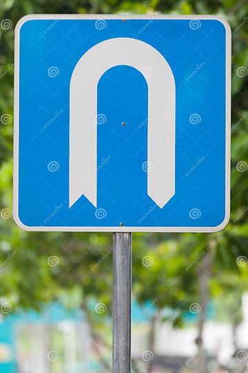 U-turn allowed road sign stock photo. Image of person - 20780688
