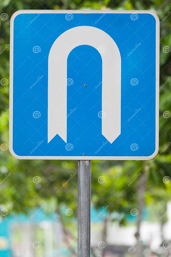 U-turn allowed road sign stock photo. Image of person - 20780688