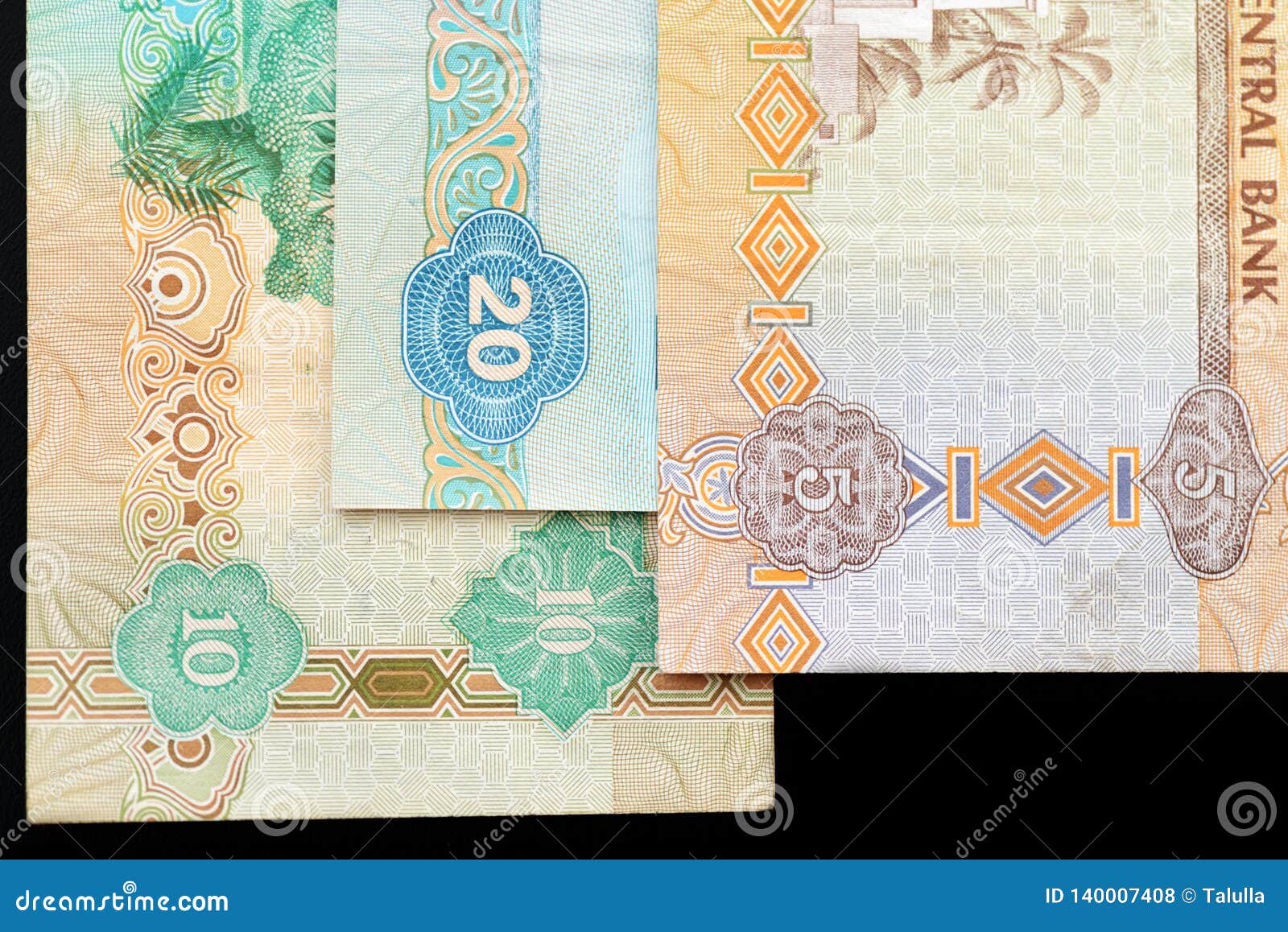 UAE Dirham Currency Notes on a Dark Background Stock Photo - Image of ...