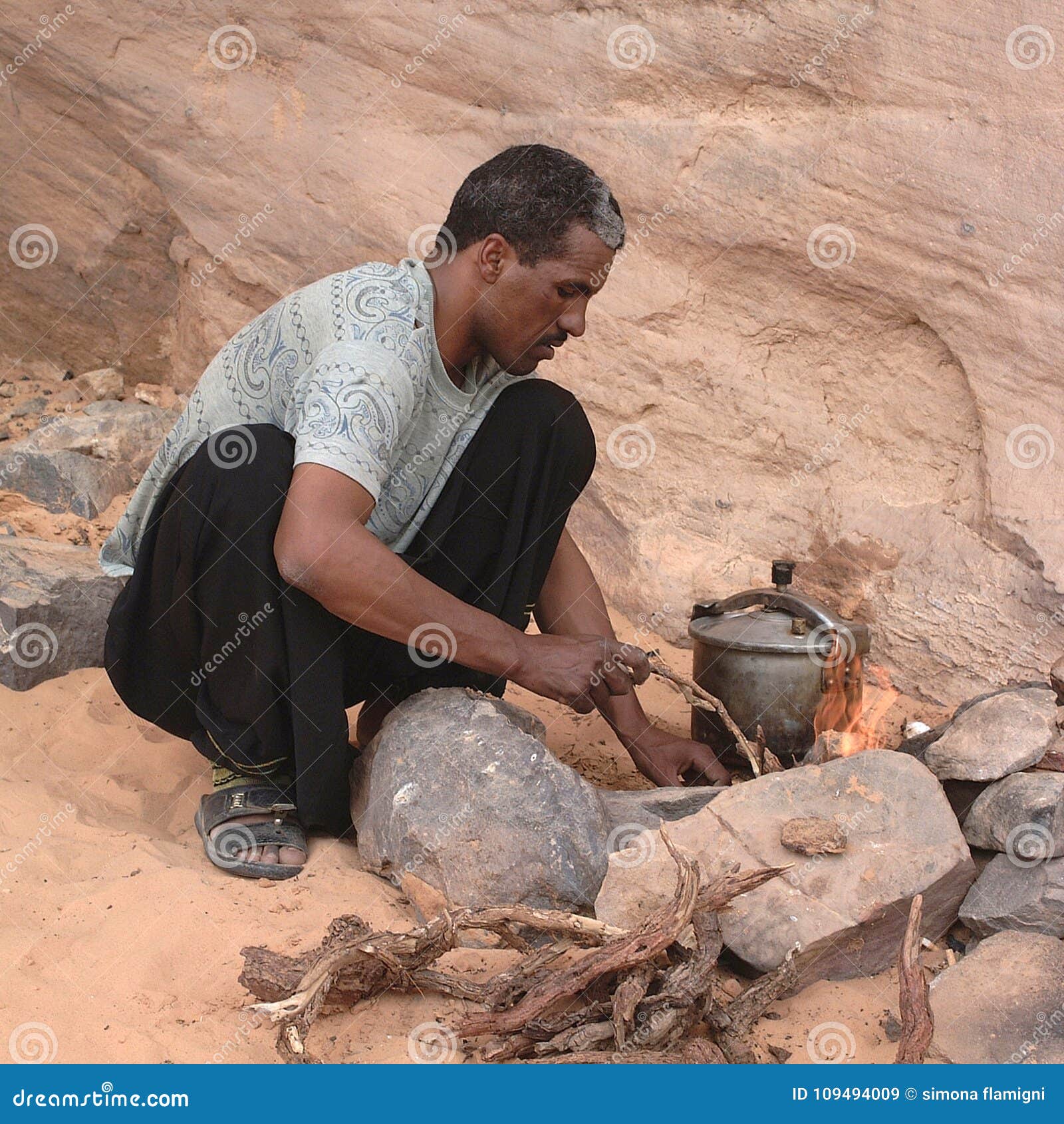 Man Setting the Fire in the Desert Editorial Stock Image - Image of ...