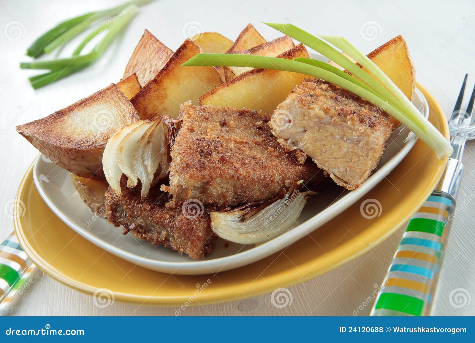 Udder of Cow, Fried in Breadcrumbs with Potatoes Stock Photo - Image of ...
