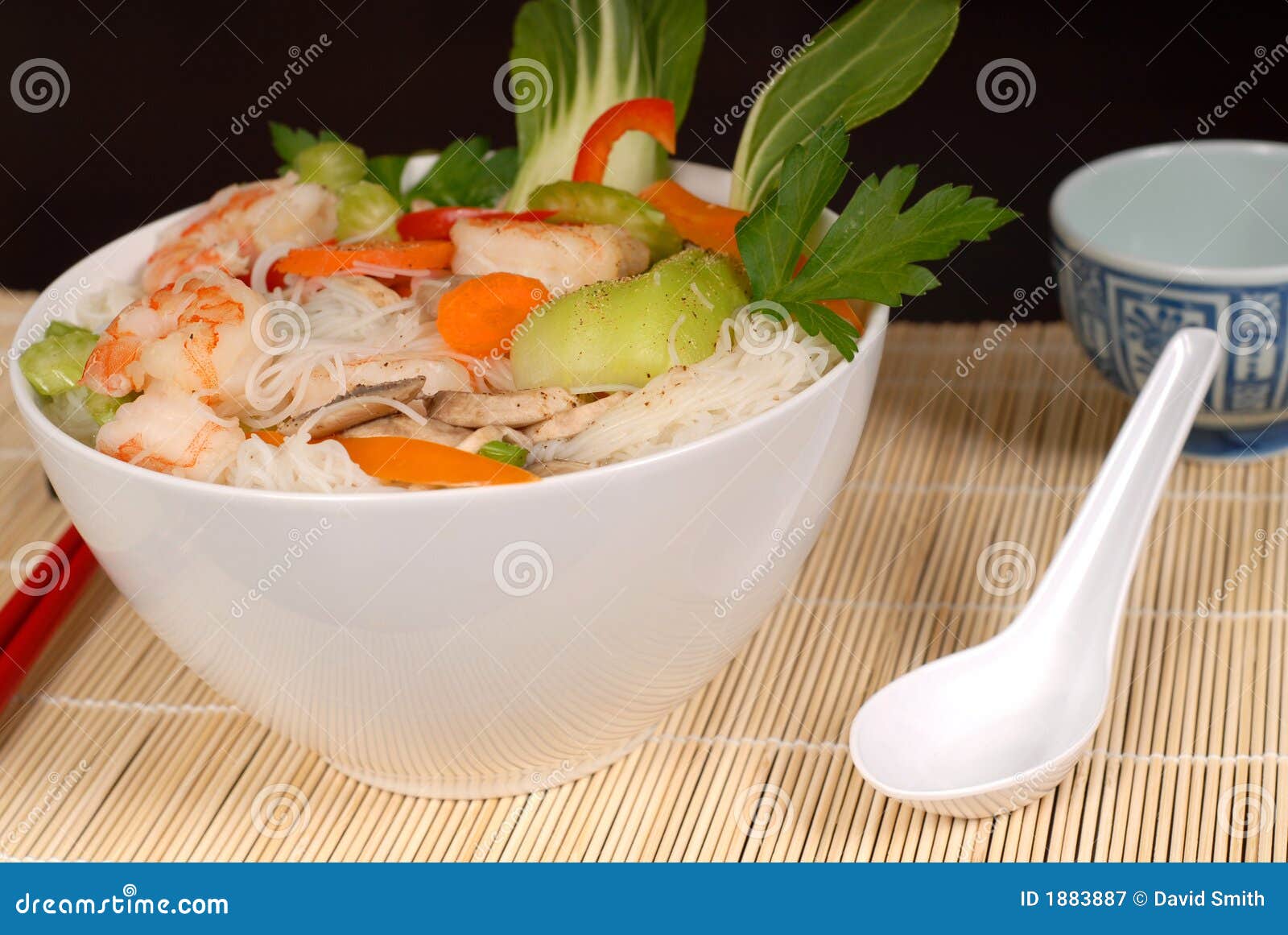 Udon Noodles with Vegetables and Seafood and Spoon Stock Image - Image ...