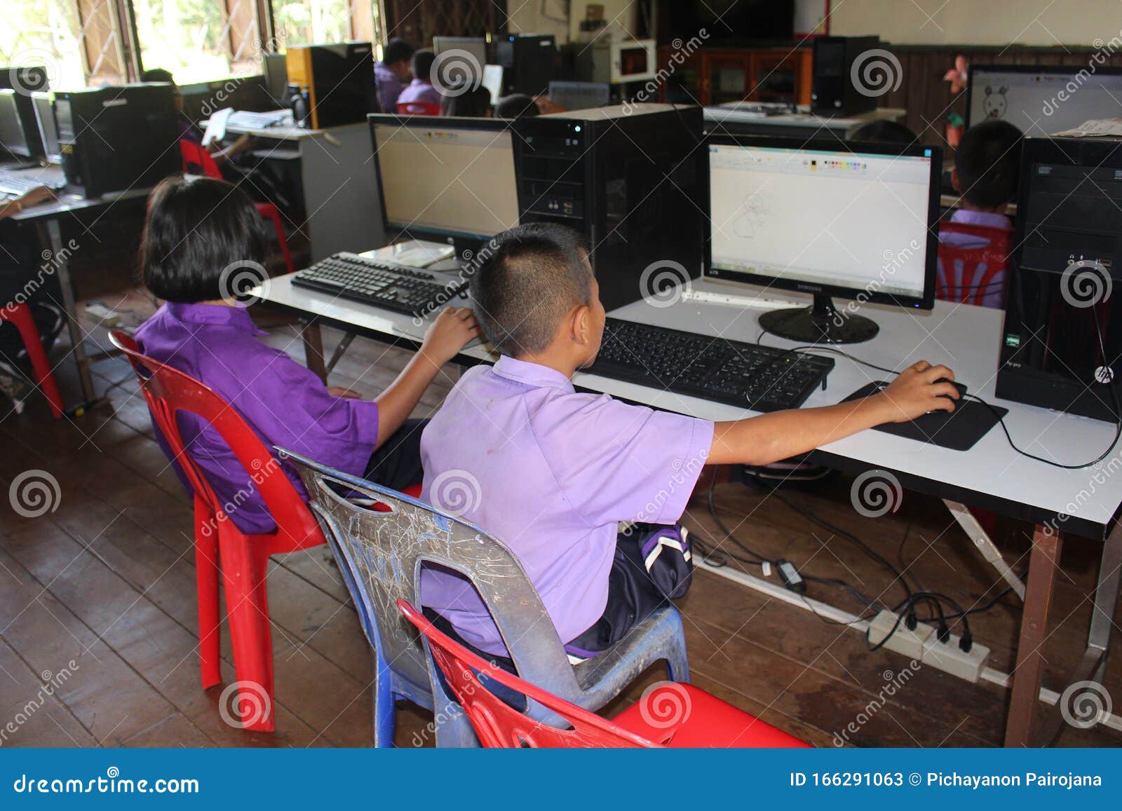 Asian Students are Using the Computer. Editorial Stock Photo - Image of ...