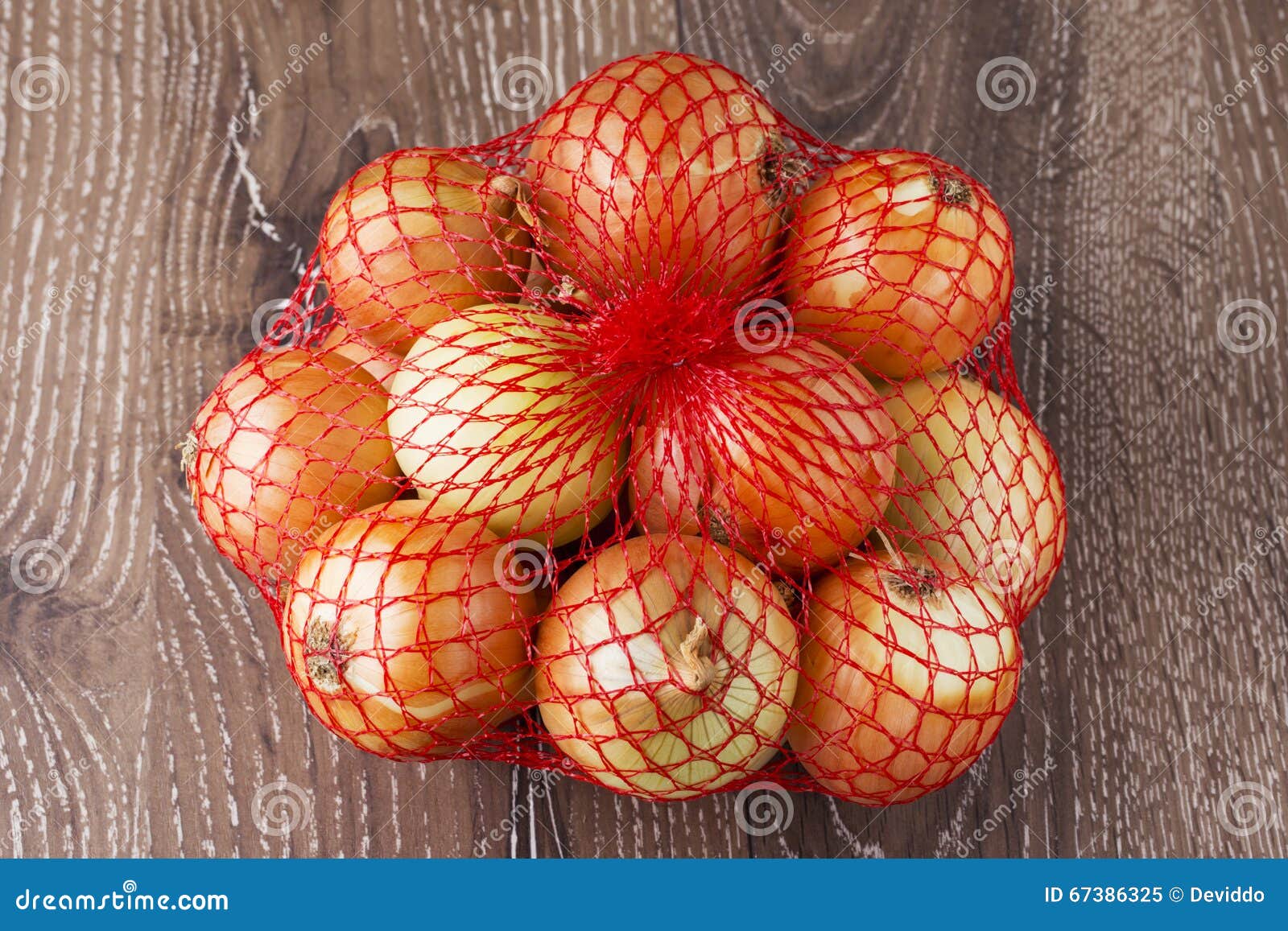 Uien in een zak stock afbeelding. Image of product, netwerk - 67386325