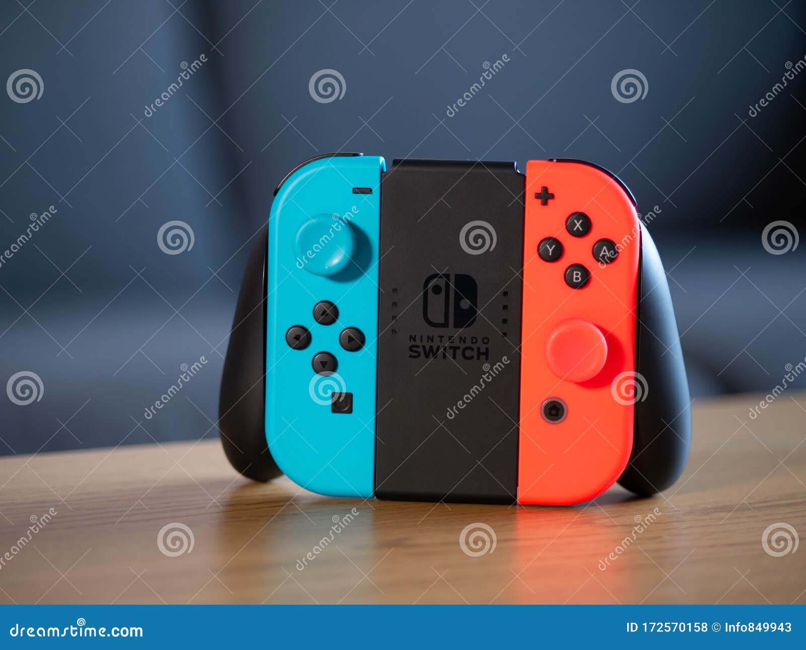 UK - Feb 2020: Nintendo Switch Blue and Red Neon Joy Con Grip Pad ...