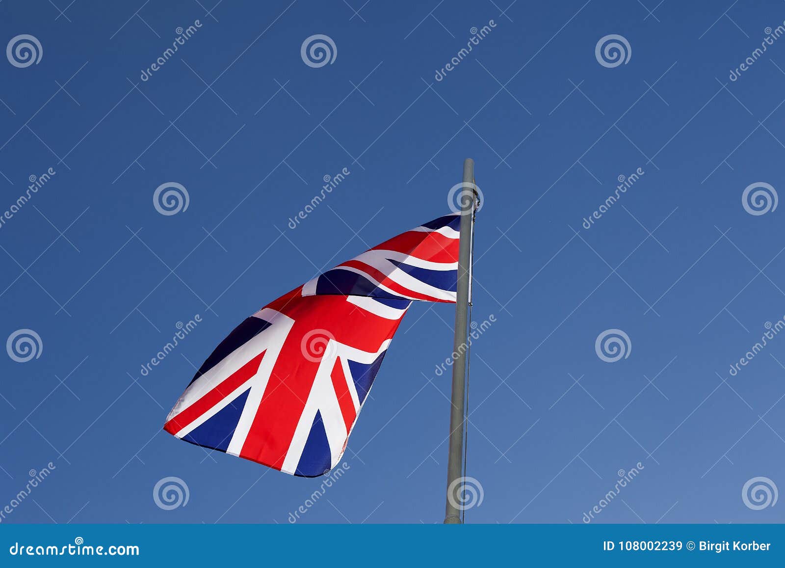 UK flag on a flagpole stock image. Image of england - 108002239