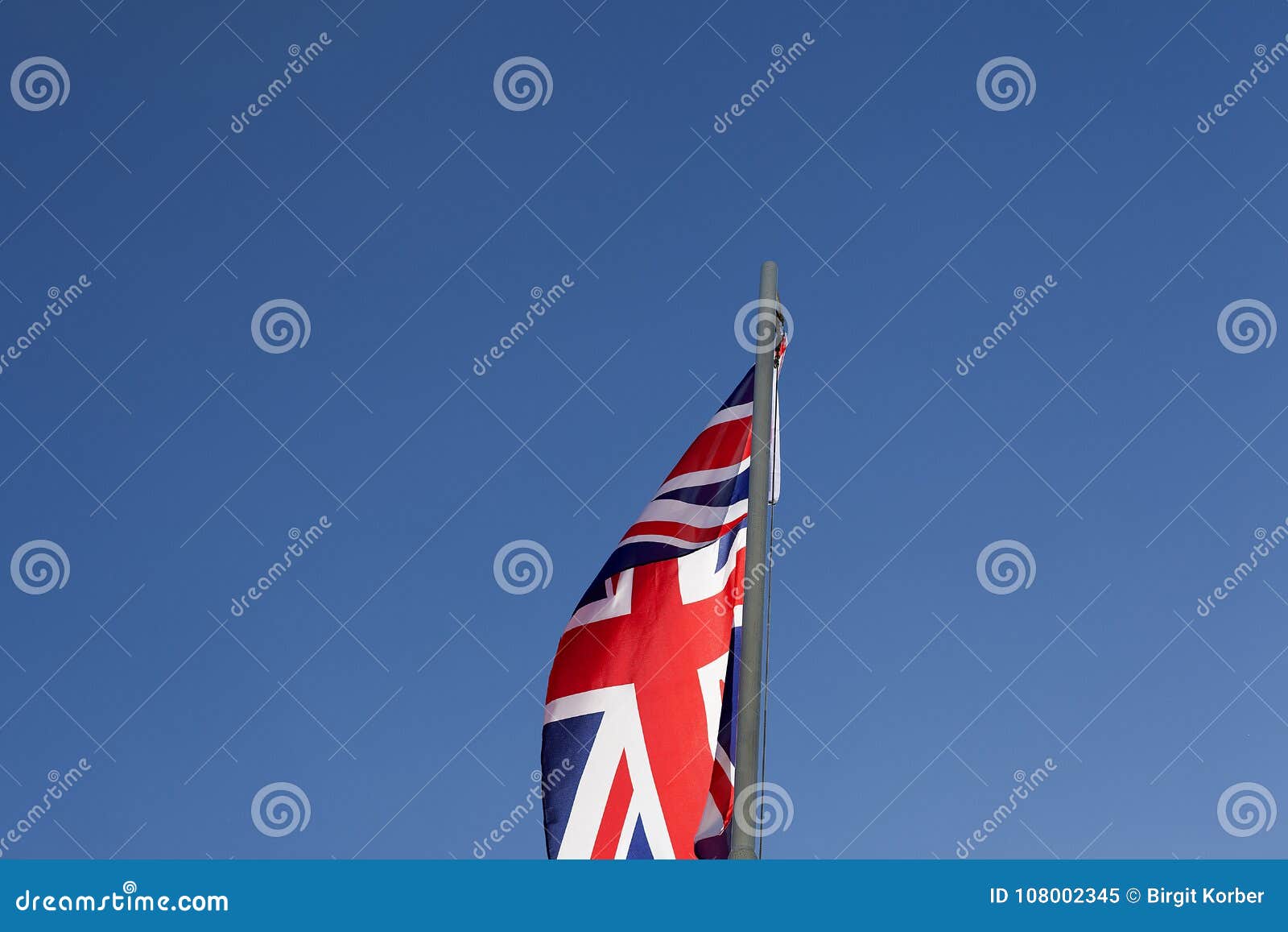 UK flag on a flagpole stock image. Image of nation, move - 108002345