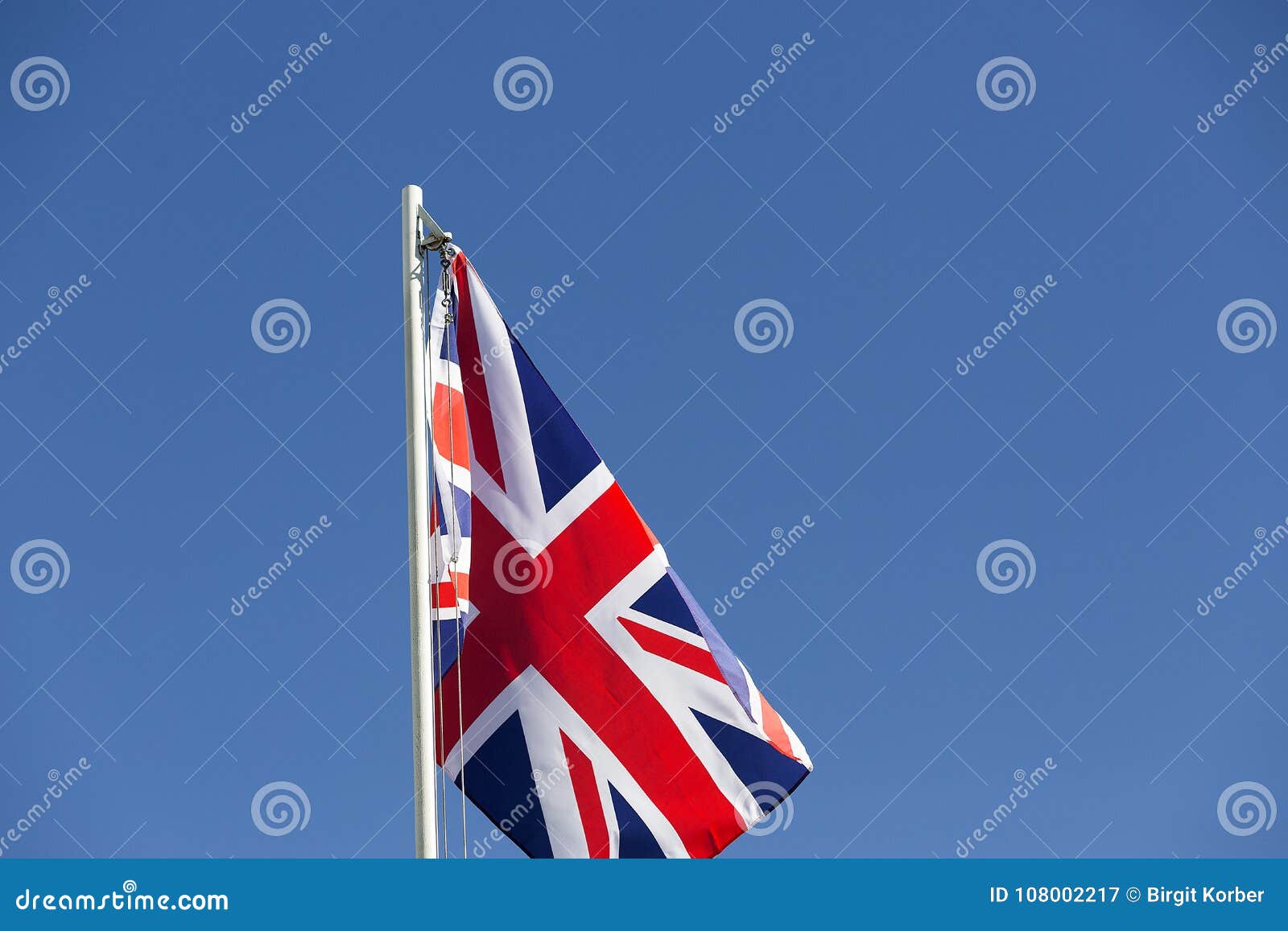 UK flag on a flagpole stock image. Image of satin, stripes - 108002217