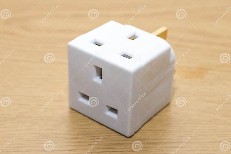 UK multi-plug adapter stock image. Image of device, equipment - 113815503