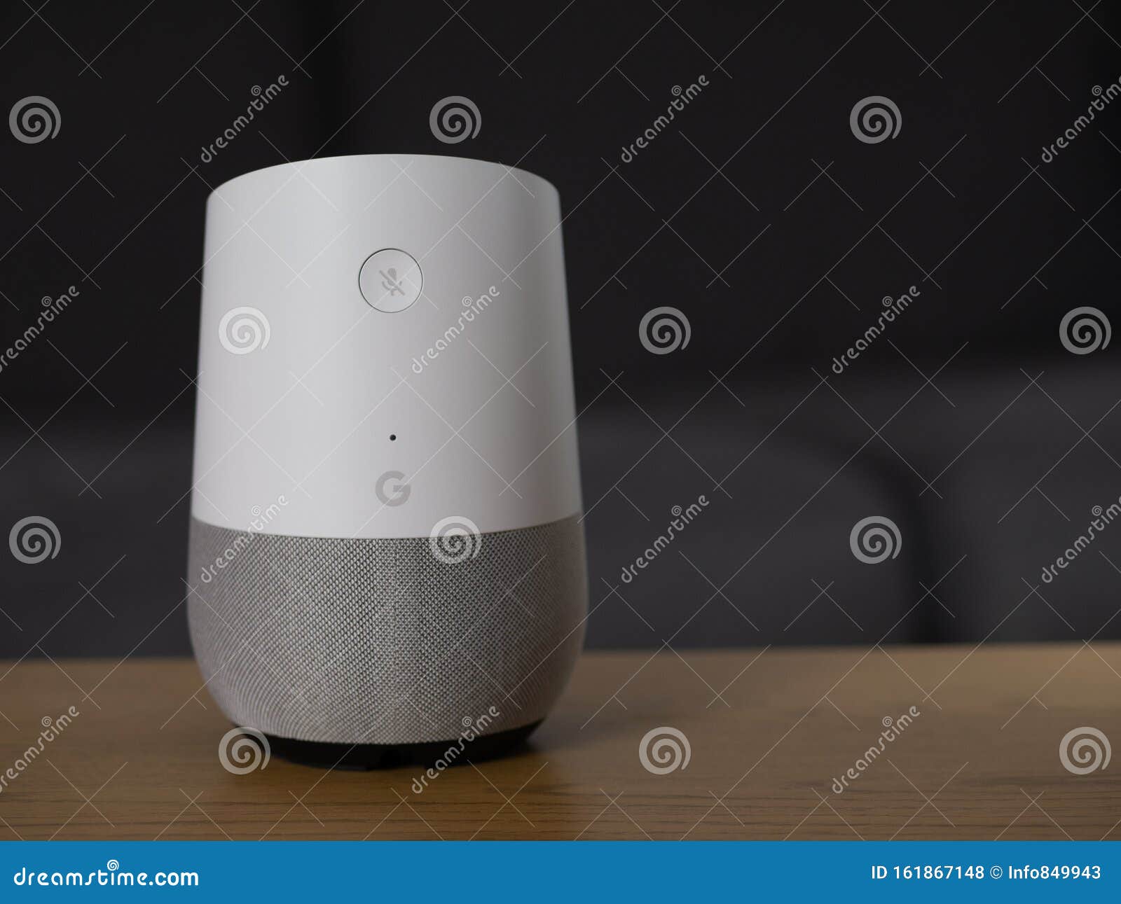 UK, October 2019: Google Home Smart Speaker on Wooden Table in Lounge ...