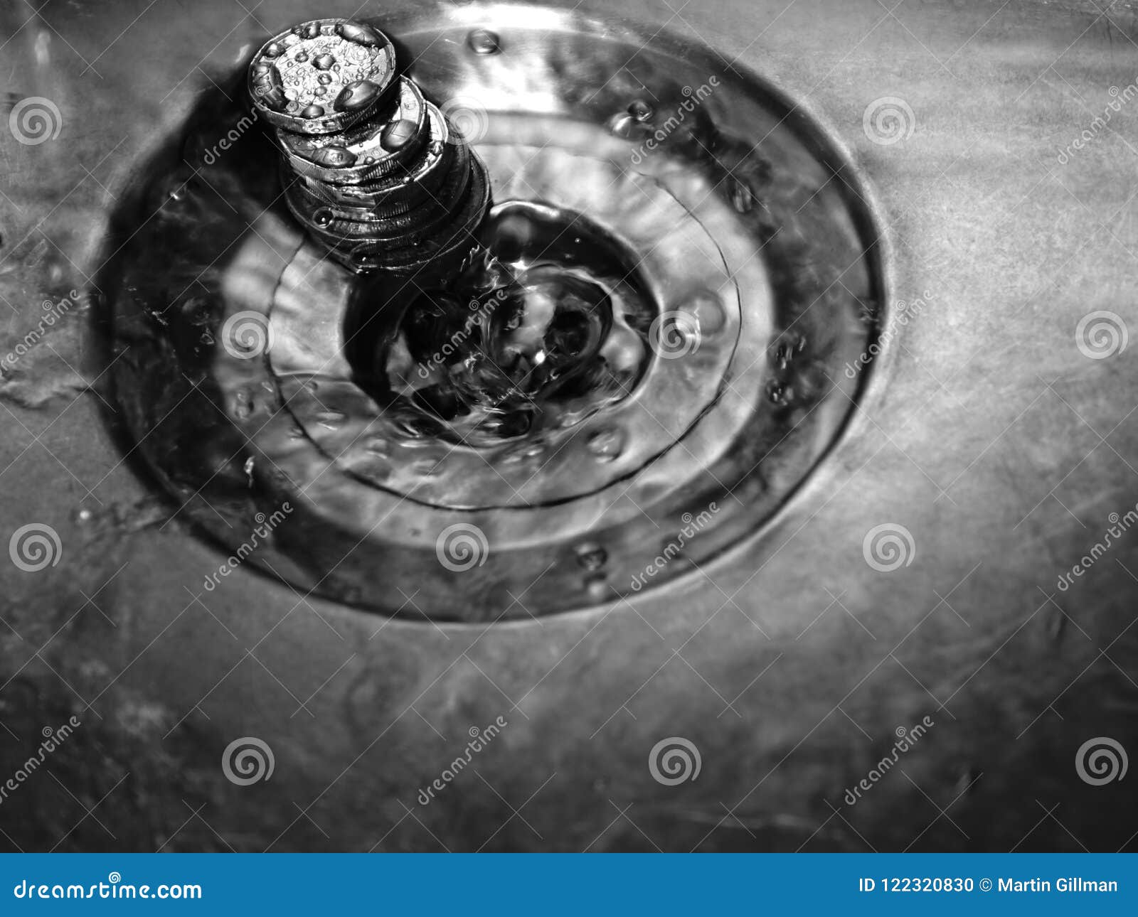 A Wet UK Pound Coin Stack by a Drain Hole. Stock Photo - Image of pile ...