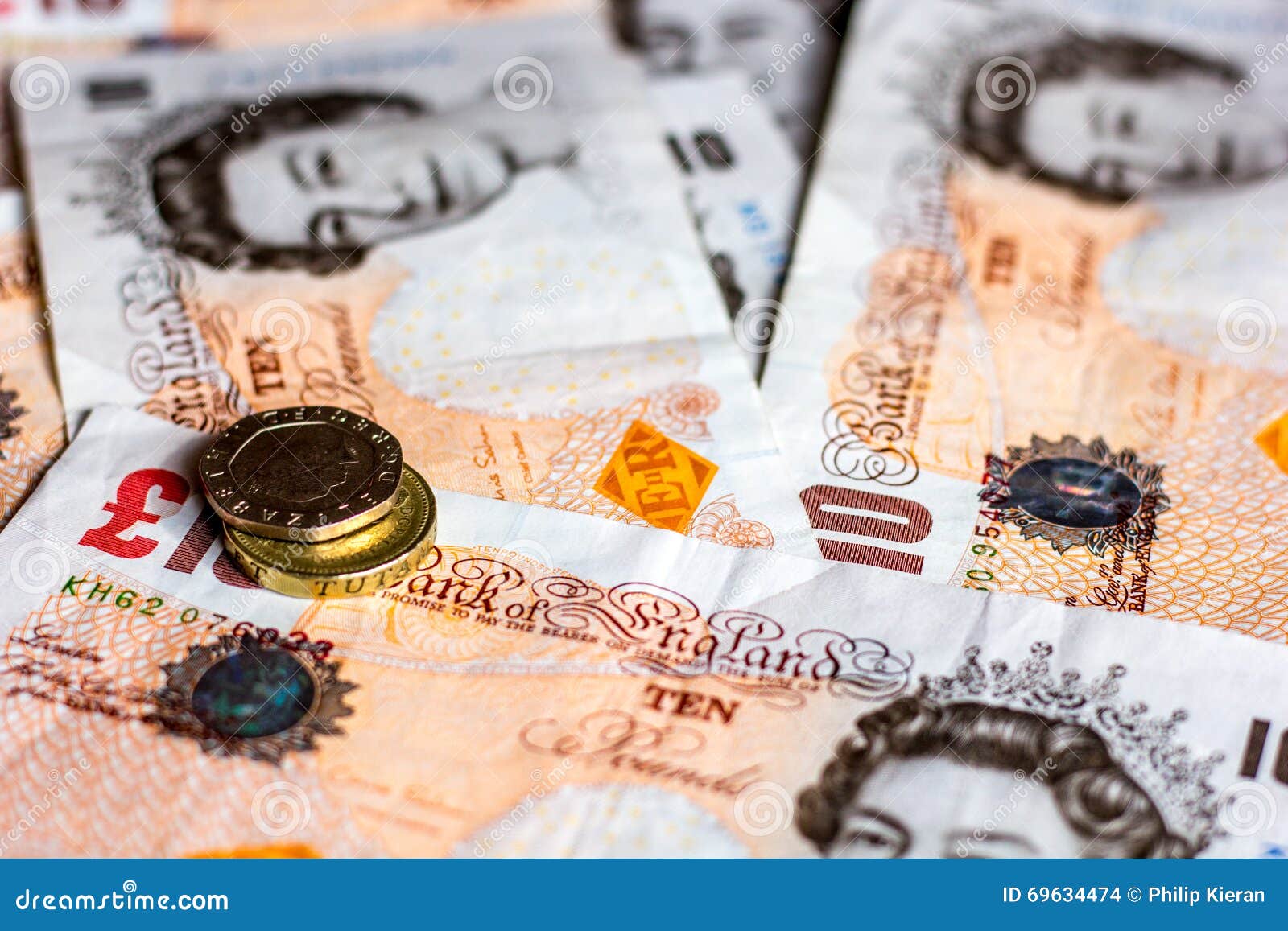 UK Ten Pound Notes and Coins Stock Photo - Image of pound, coin: 69634474