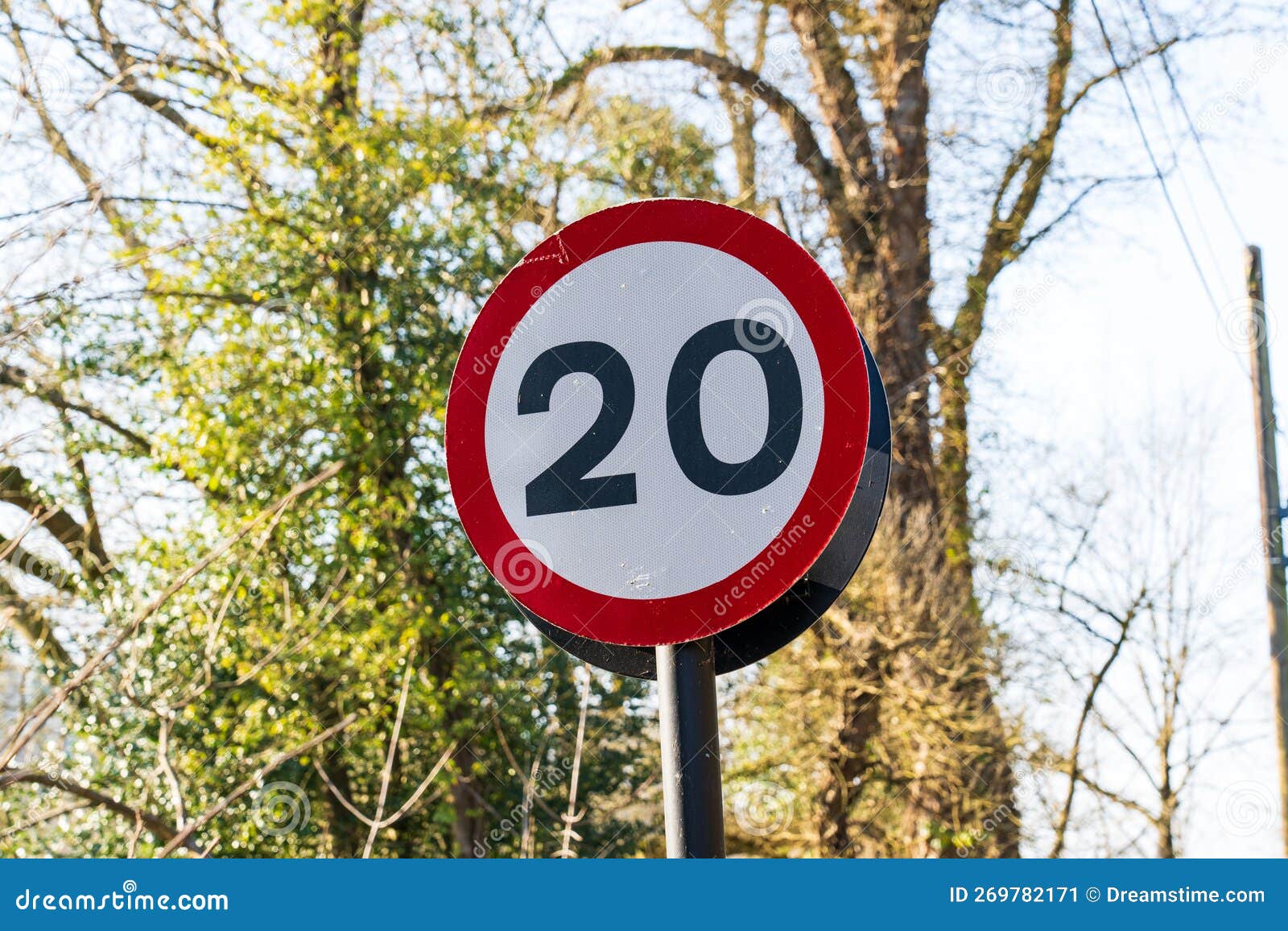 A UK Traffic Sign Showing.a 20 Mph Maximum Speed Limit with a Red and ... A UK Traffic Sign Showing.a 20 Mph Maximum Speed Limit with a Red and ...