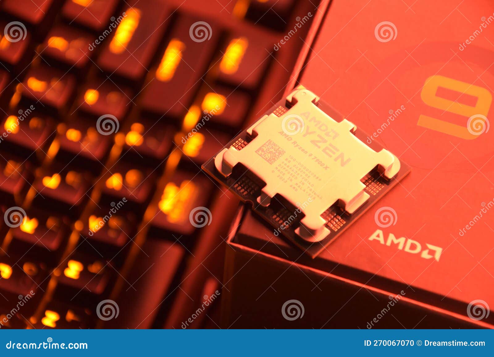 A Close-up of an AMD Ryzen 9 7900X Processor in a Packaging Box with ...