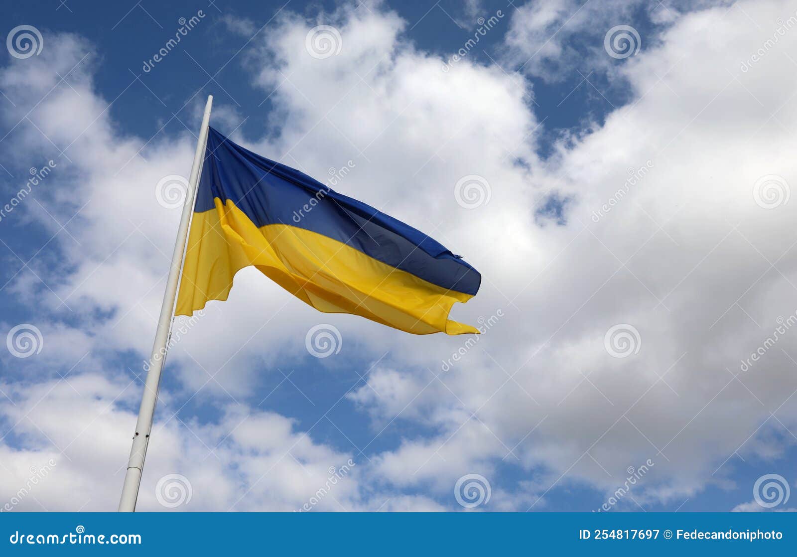 Ukrainian Flag Flying with the Background of Blue Sky and White Stock ...