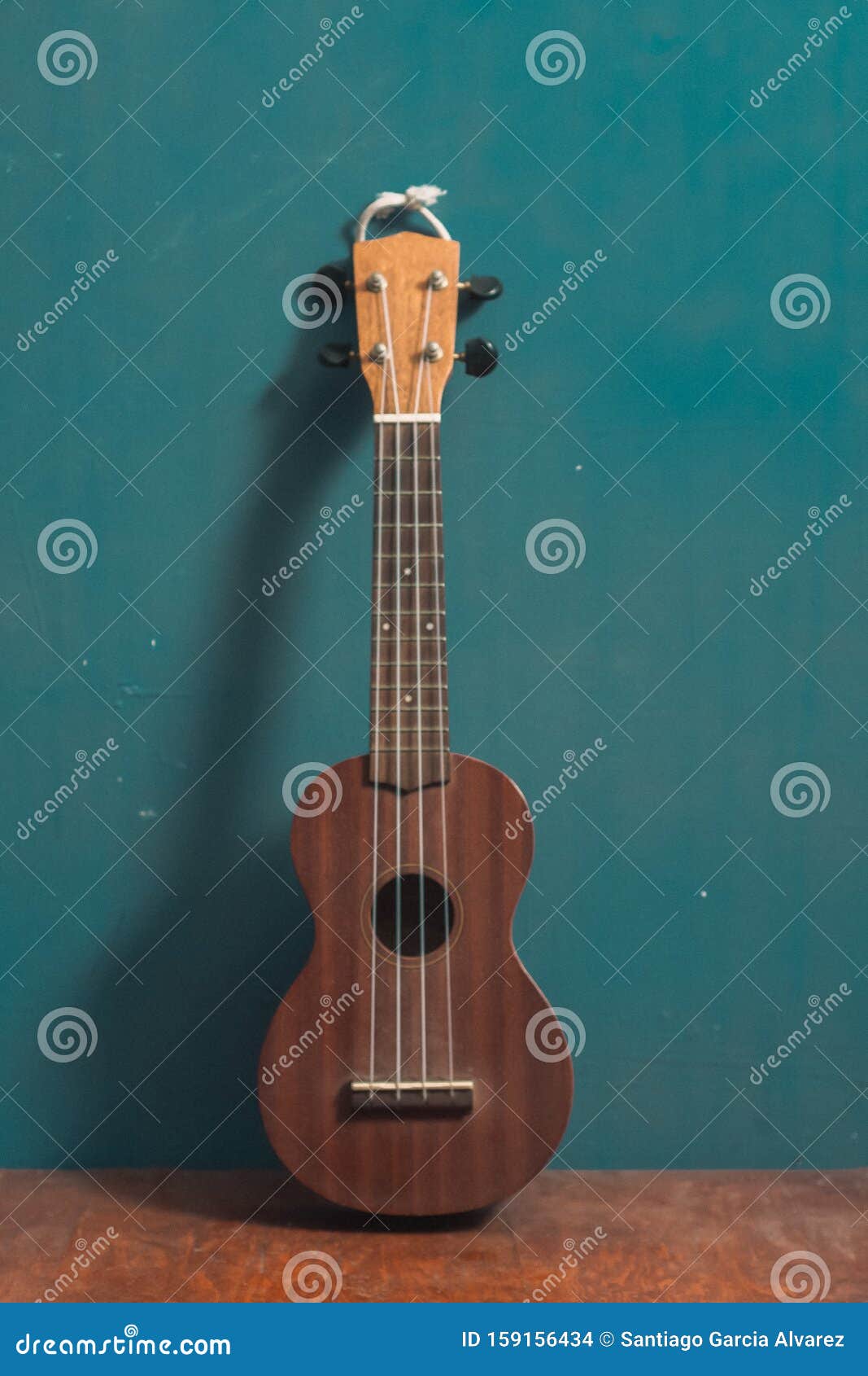 Ukulele In Front View With Isolated Blue Background Royalty-Free Stock ...