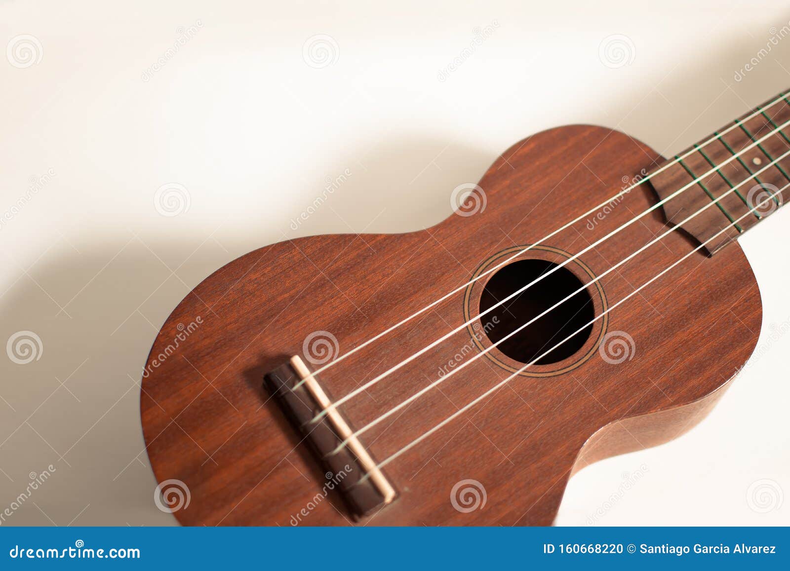 Ukulele In Front View With Isolated Blue Background Royalty-Free Stock ...