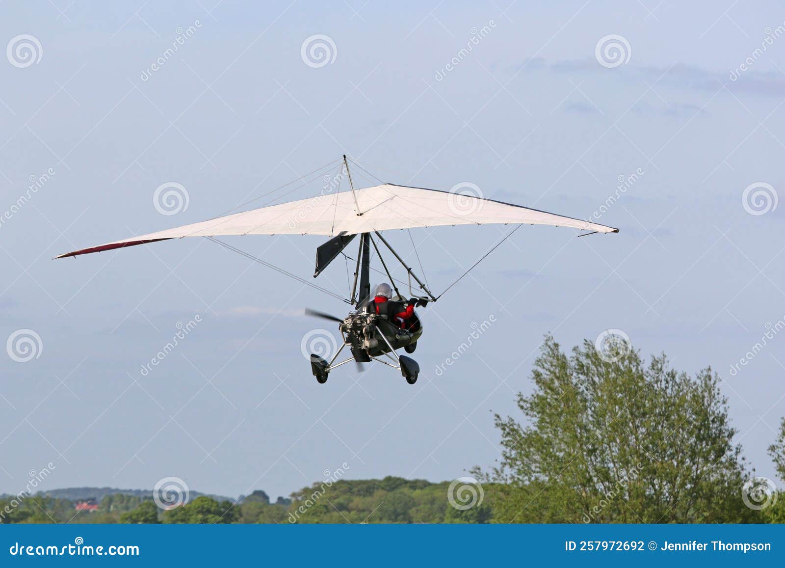 Ultralight Airplane Flying in a Blue Sky Stock Photo - Image of wing ...