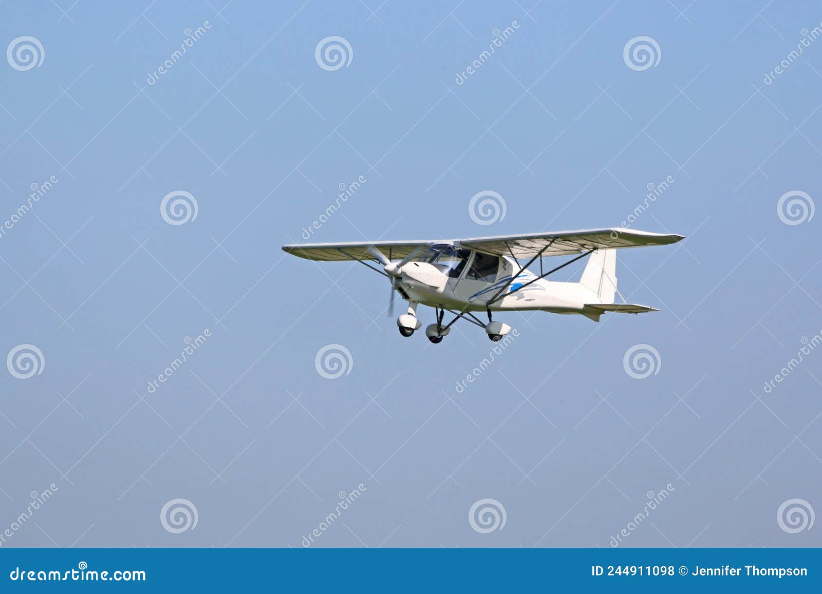 Ultralight Airplane Flying in a Blue Sky Stock Photo - Image of ...