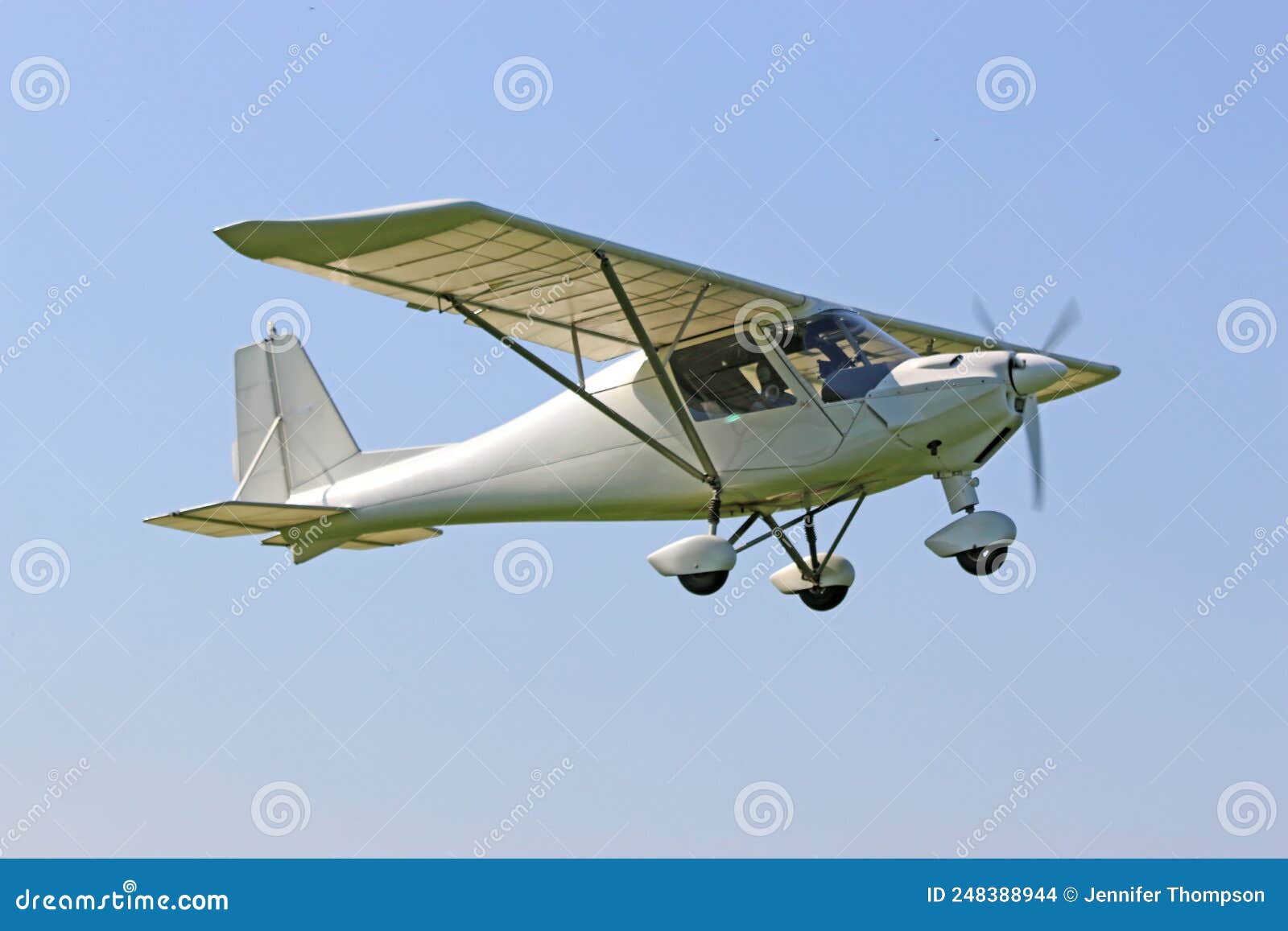 Ultralight Airplane Flying in a Blue Sky Stock Photo - Image of ...