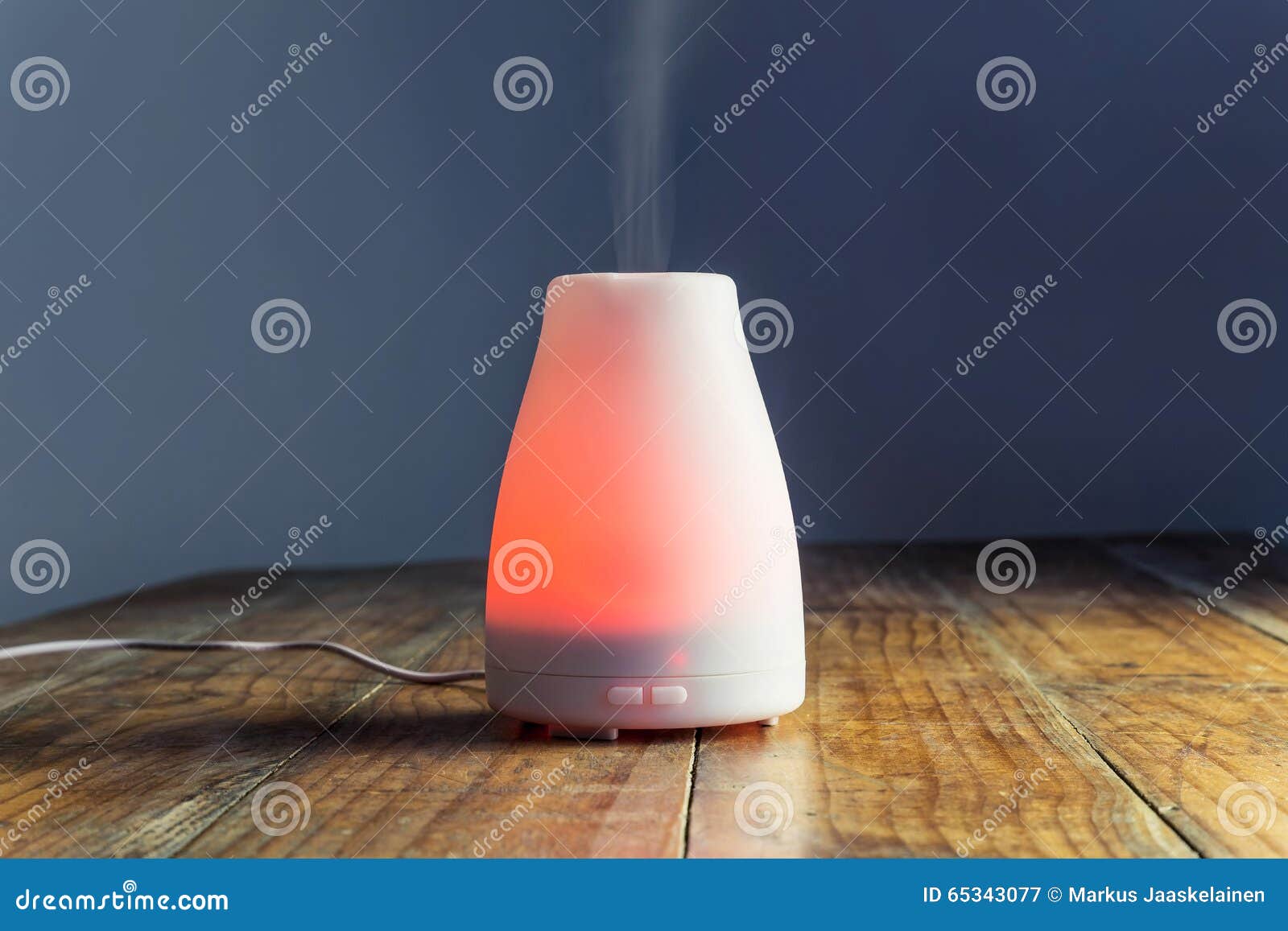 Ultrasonic Essential Oil Diffuser with Orange Light Stock Image - Image ...