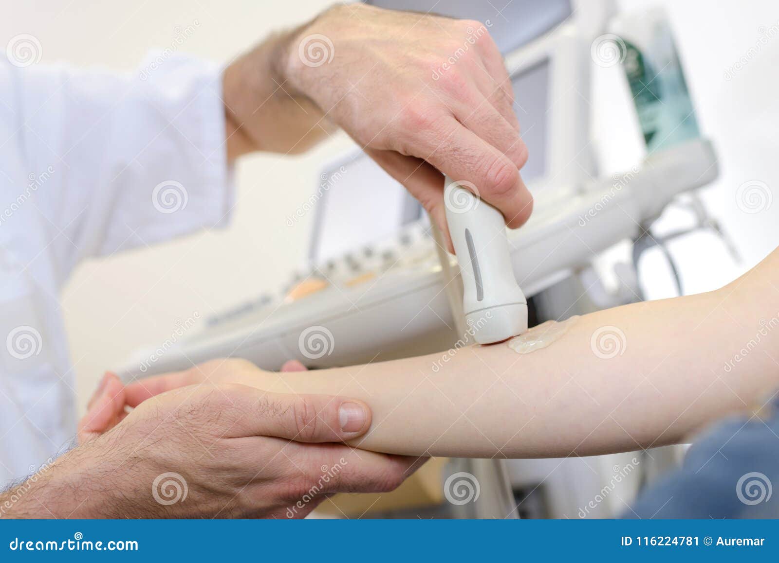 Ultrasonography on the arm stock image. Image of record - 116224781