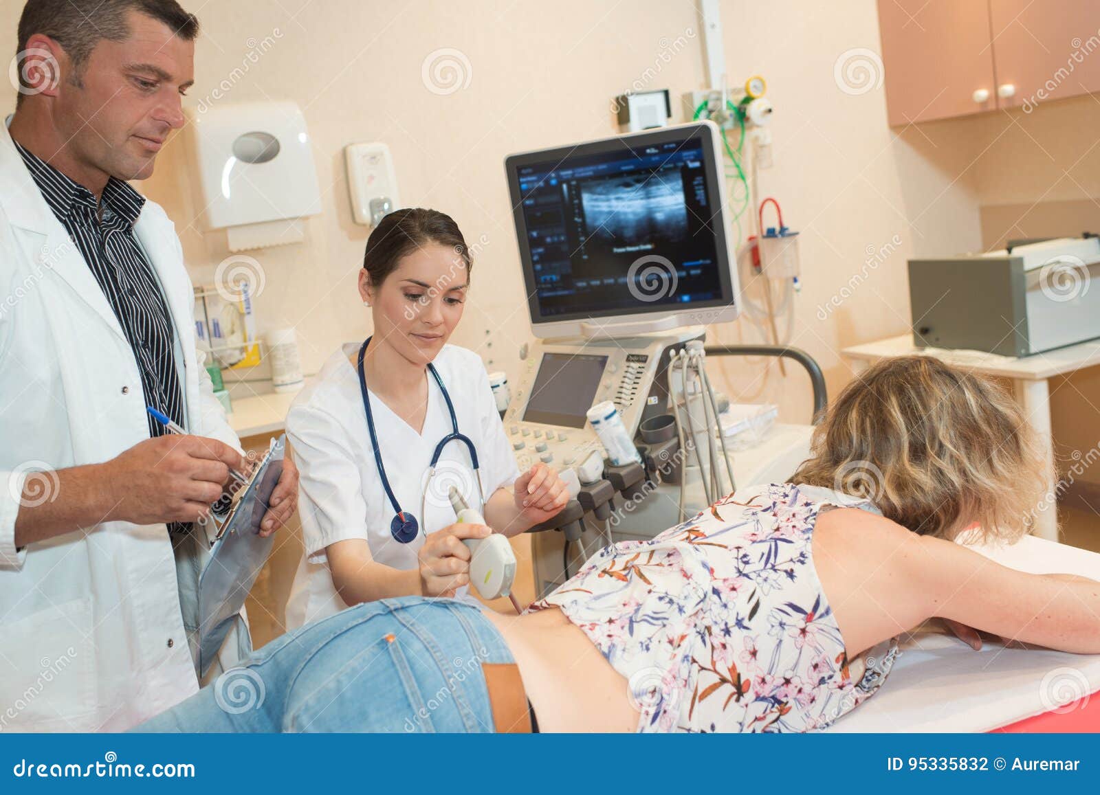 Ultrasound on lower back stock photo. Image of review - 95335832