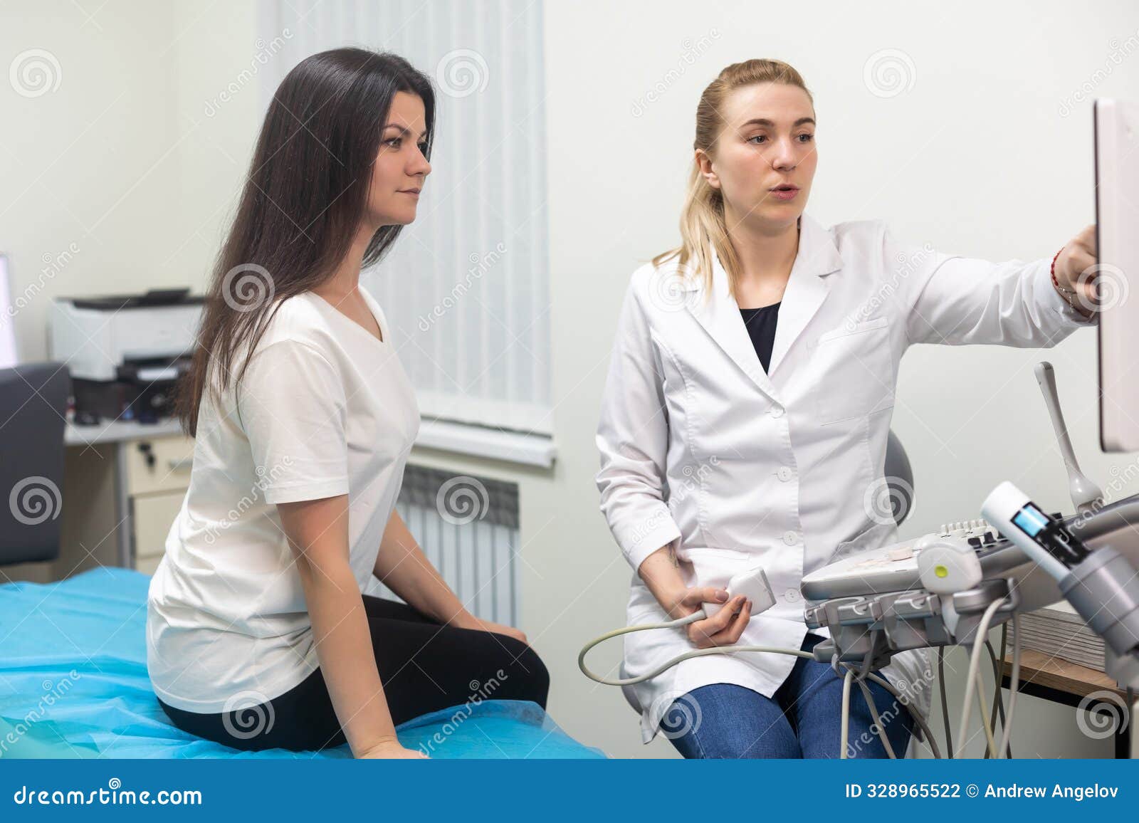 Ultrasound Scanner in the Hands of a Doctor. Diagnostics. Sonography ...