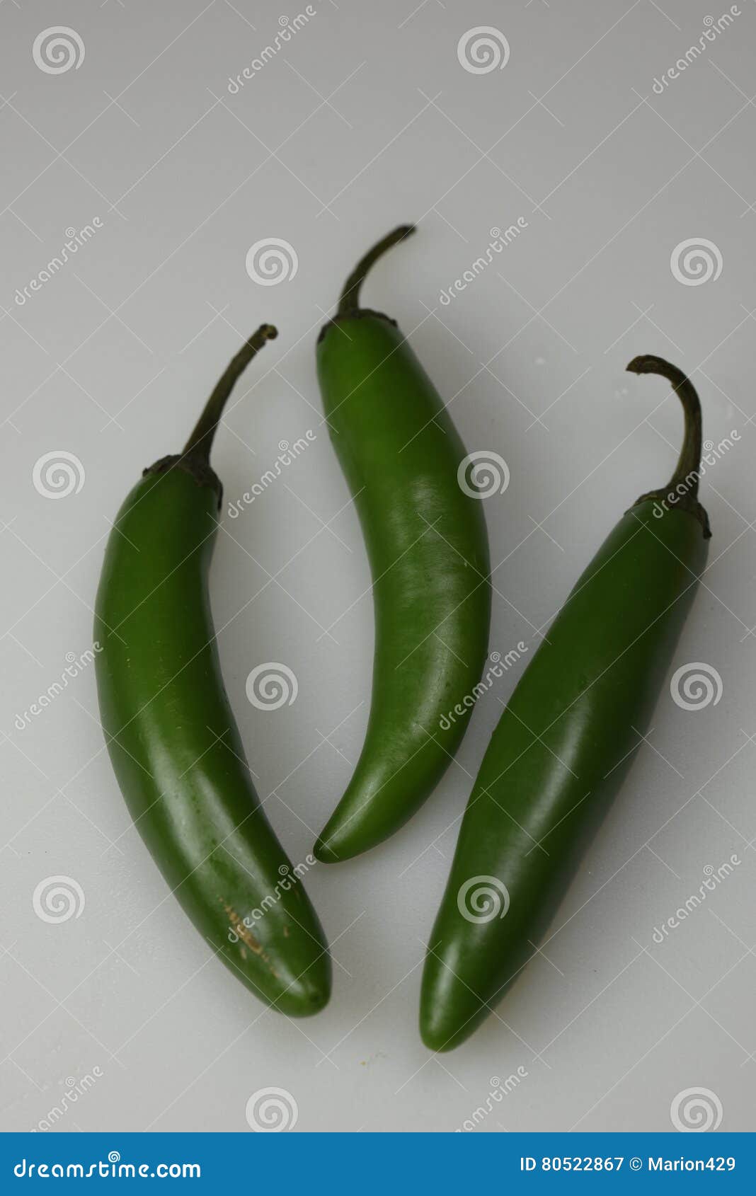 Um Trio De Pimentas Do Serrano Imagem de Stock - Imagem de naughty ...