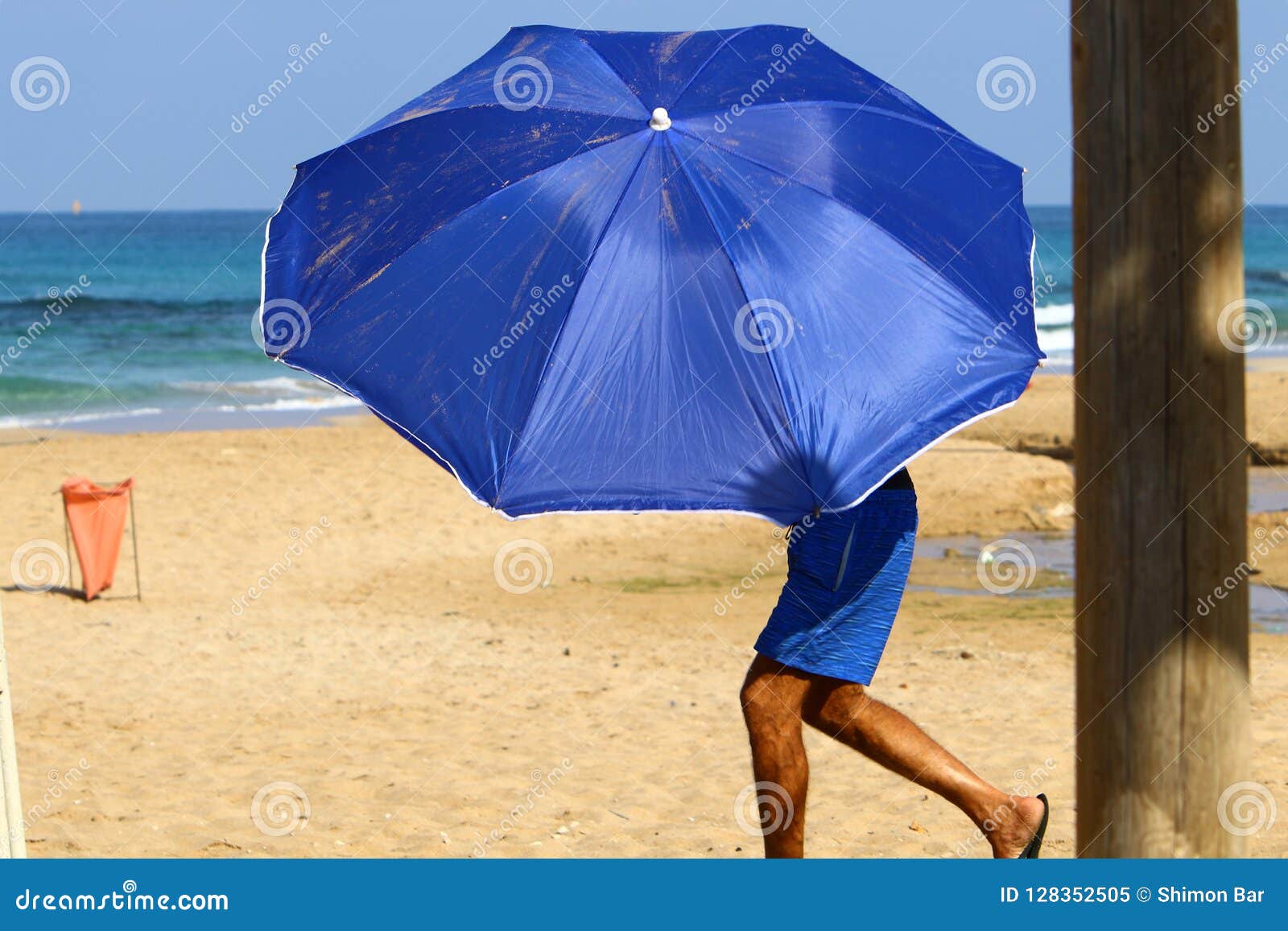 Umbrella by the sea stock image. Image of mediterranean - 128352505