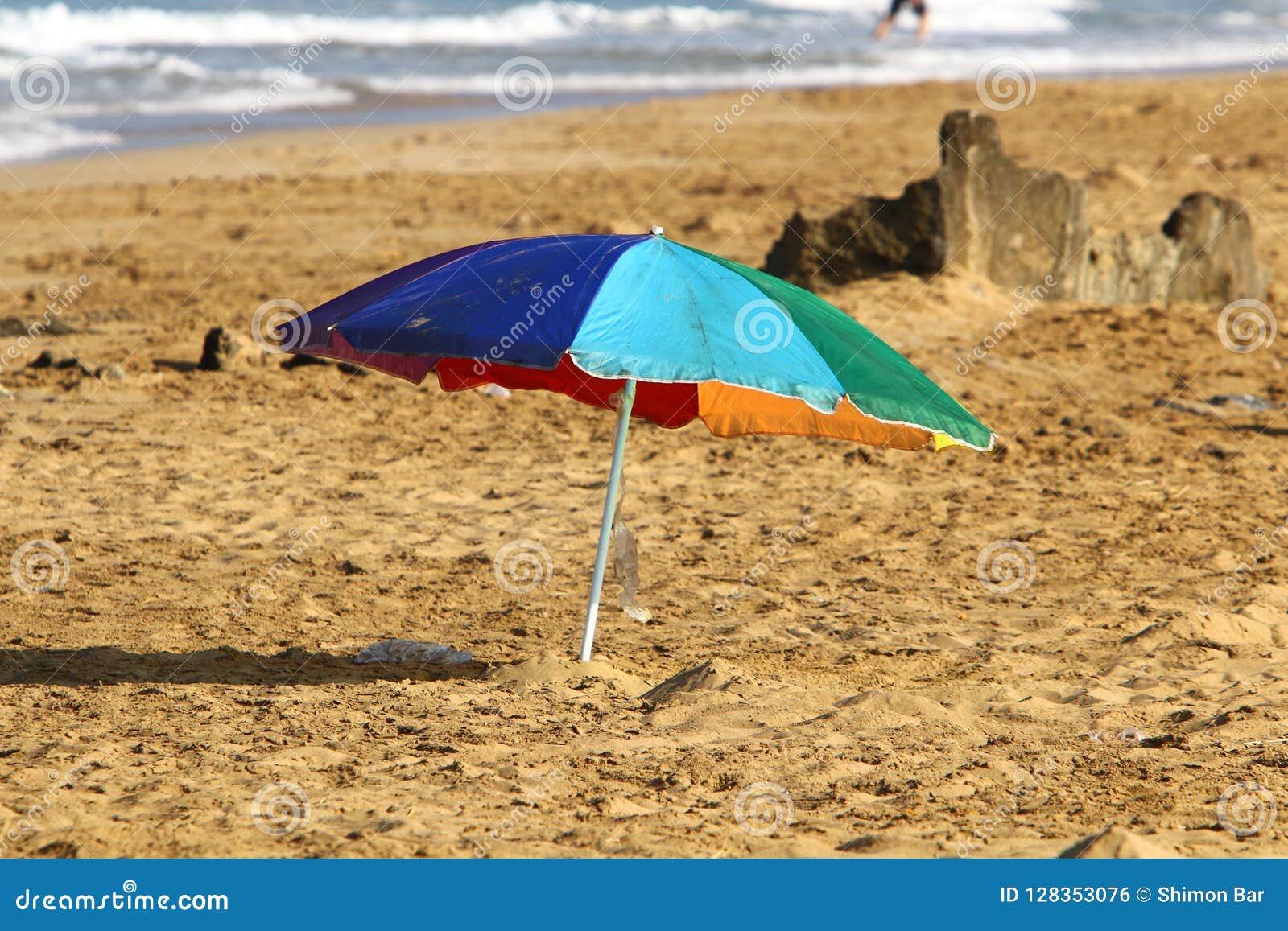 Umbrella by the sea stock photo. Image of shade, morning - 128353076