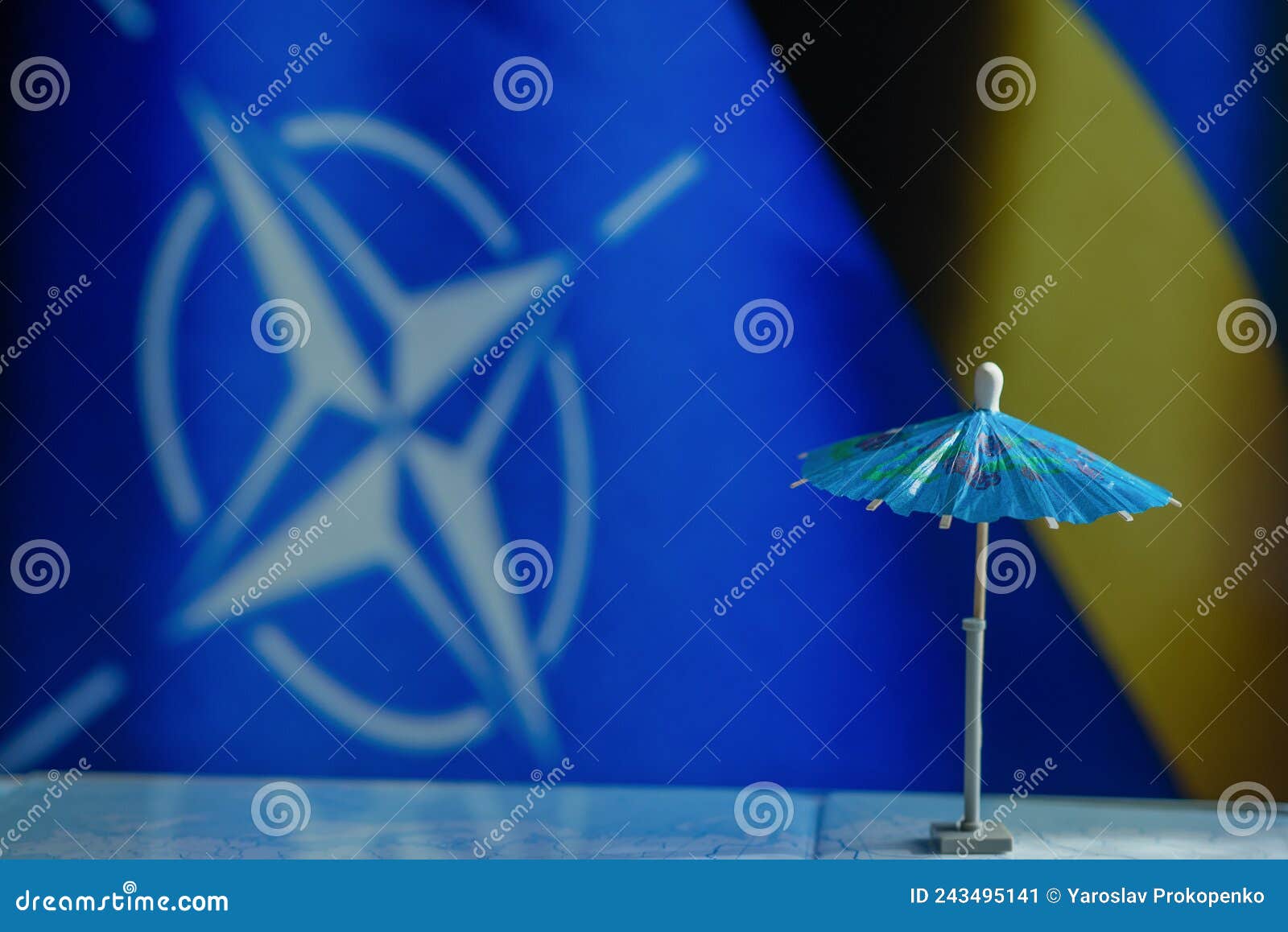 Umbrella Small on the Background of the Map and the Flag of NATO Stock ...