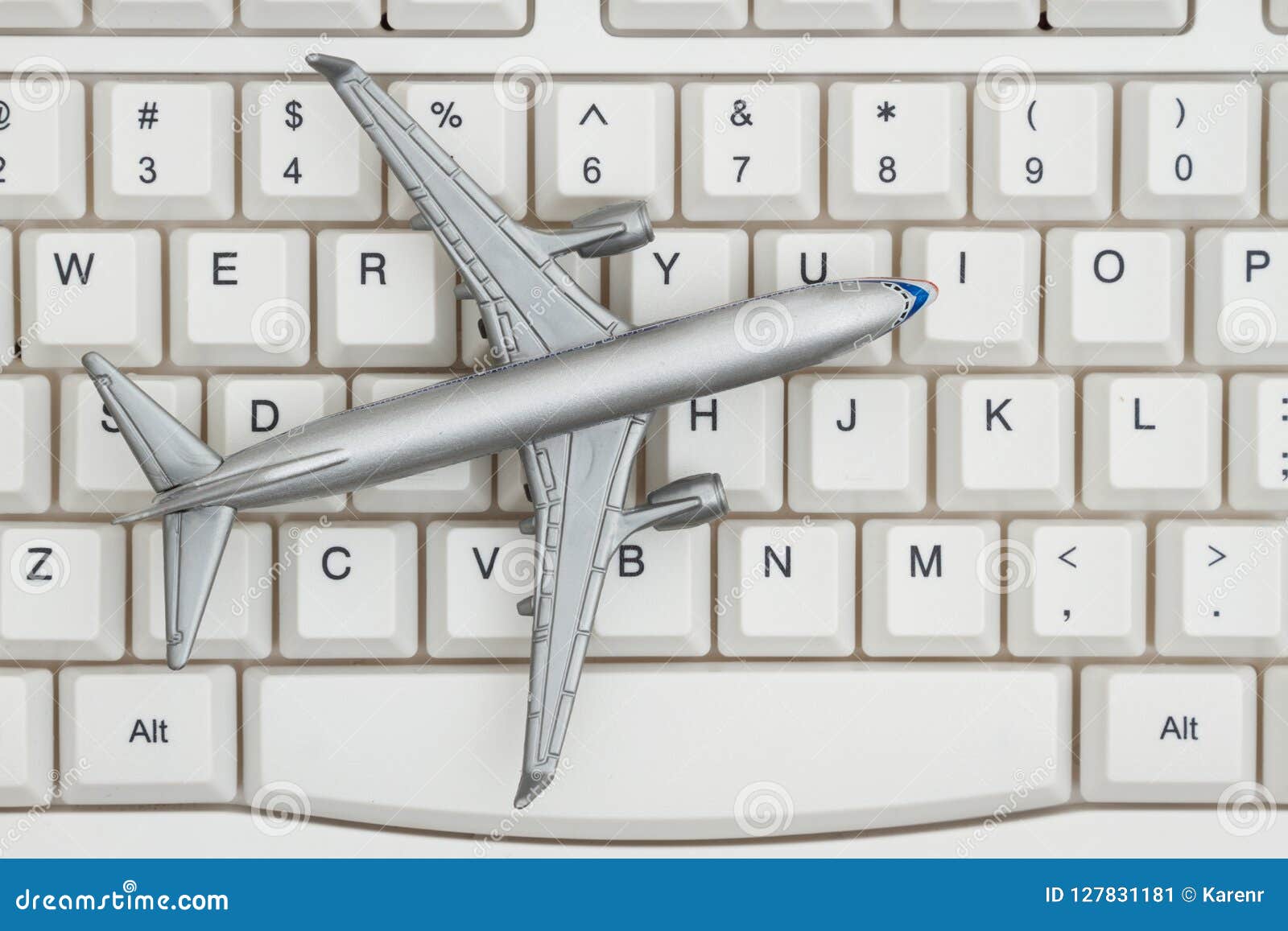 Un avion sur un clavier image stock. Image of clé, internet - 127831181