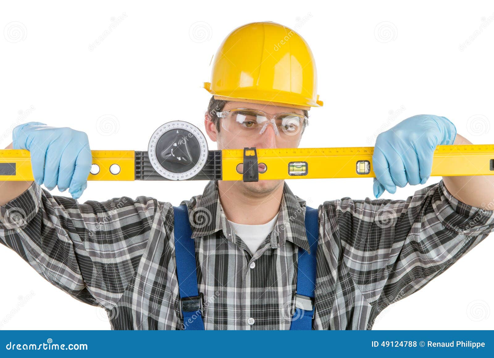 Un Giovane Operaio Con Un Livello Fotografia Stock - Immagine di ...