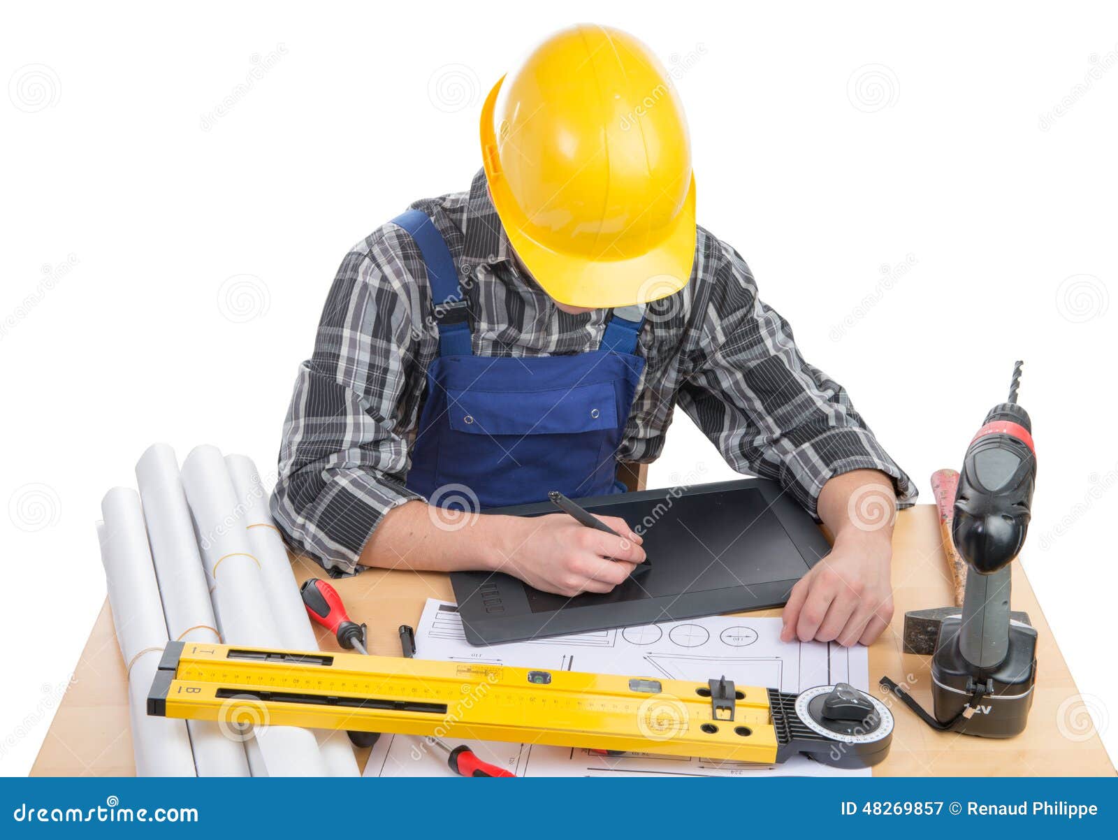 Un Giovane Operaio Con Una Compressa Immagine Stock - Immagine di ...