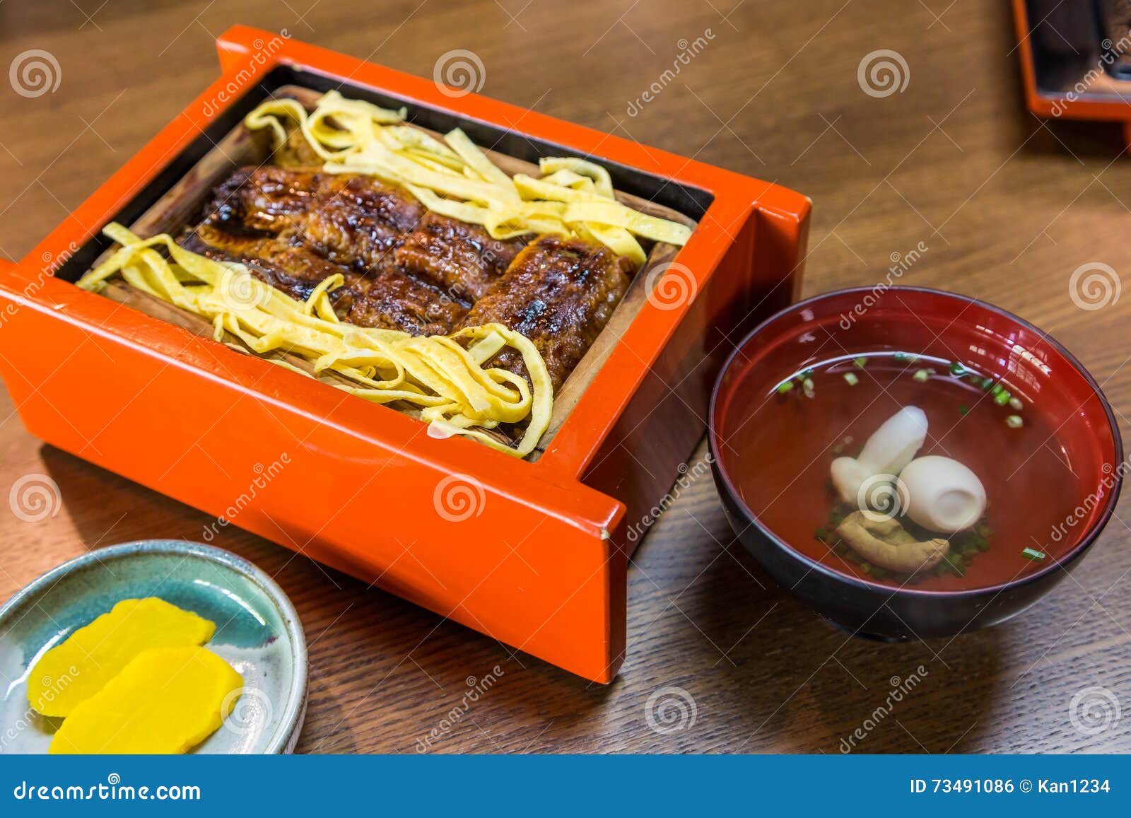 Unagi Don - Grill Eel Rice in Red Box with Clear Soup. Stock Photo ...