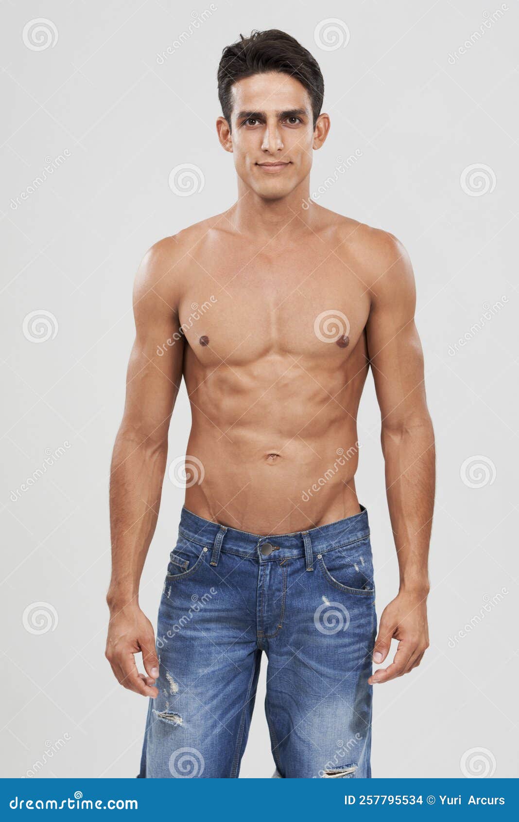 Unashamed of Being Himself. a Handsome Young Shirtless Man Posing in ... Unashamed of Being Himself. a Handsome Young Shirtless Man Posing in ...