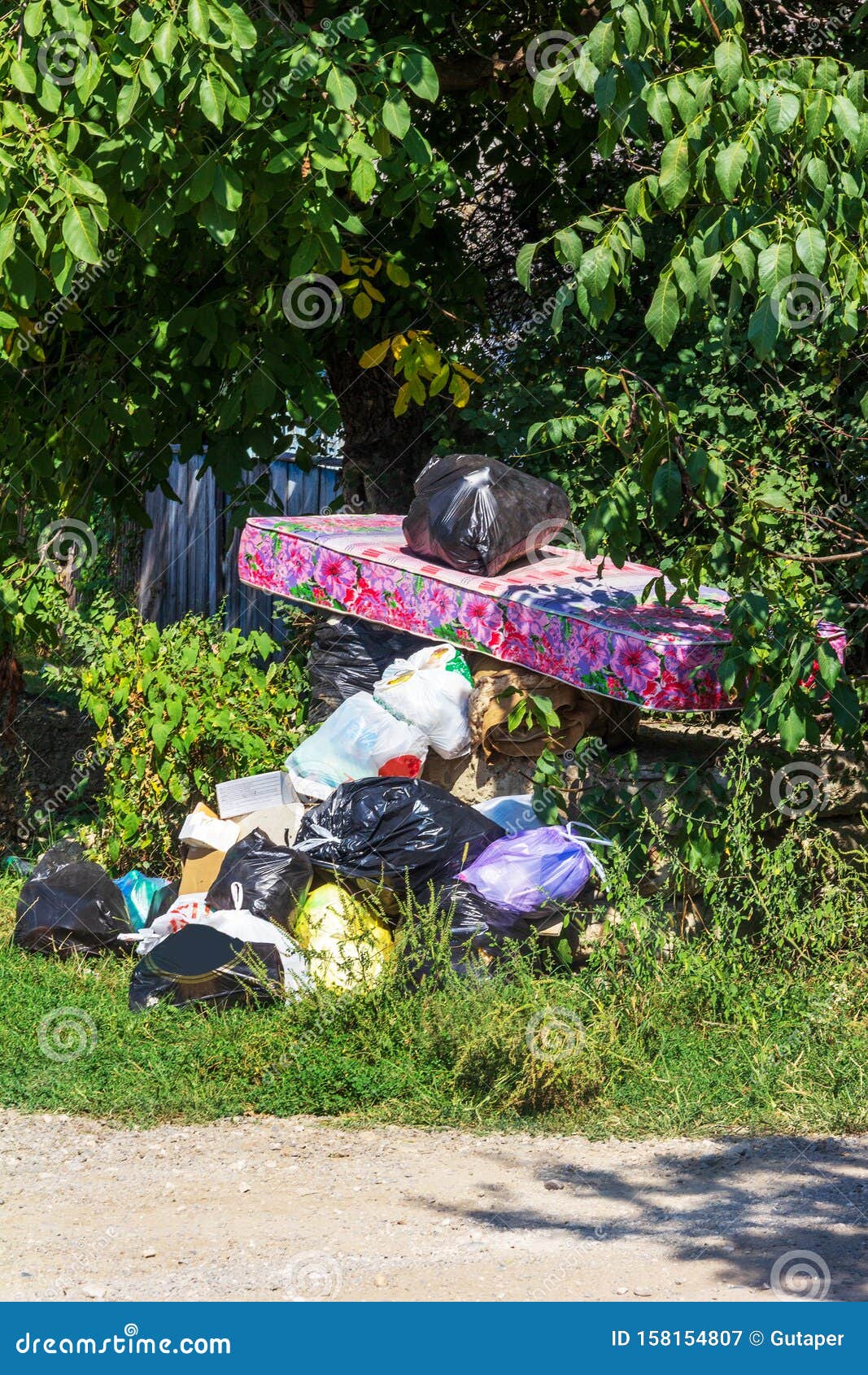An Unauthorized Pile of Garbage in the Countryside. Stock Image - Image ...