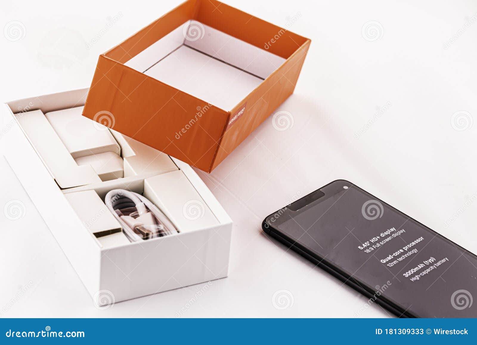 Unboxing of a Smartphone with Its Charger in a Box Stock Image - Image ...