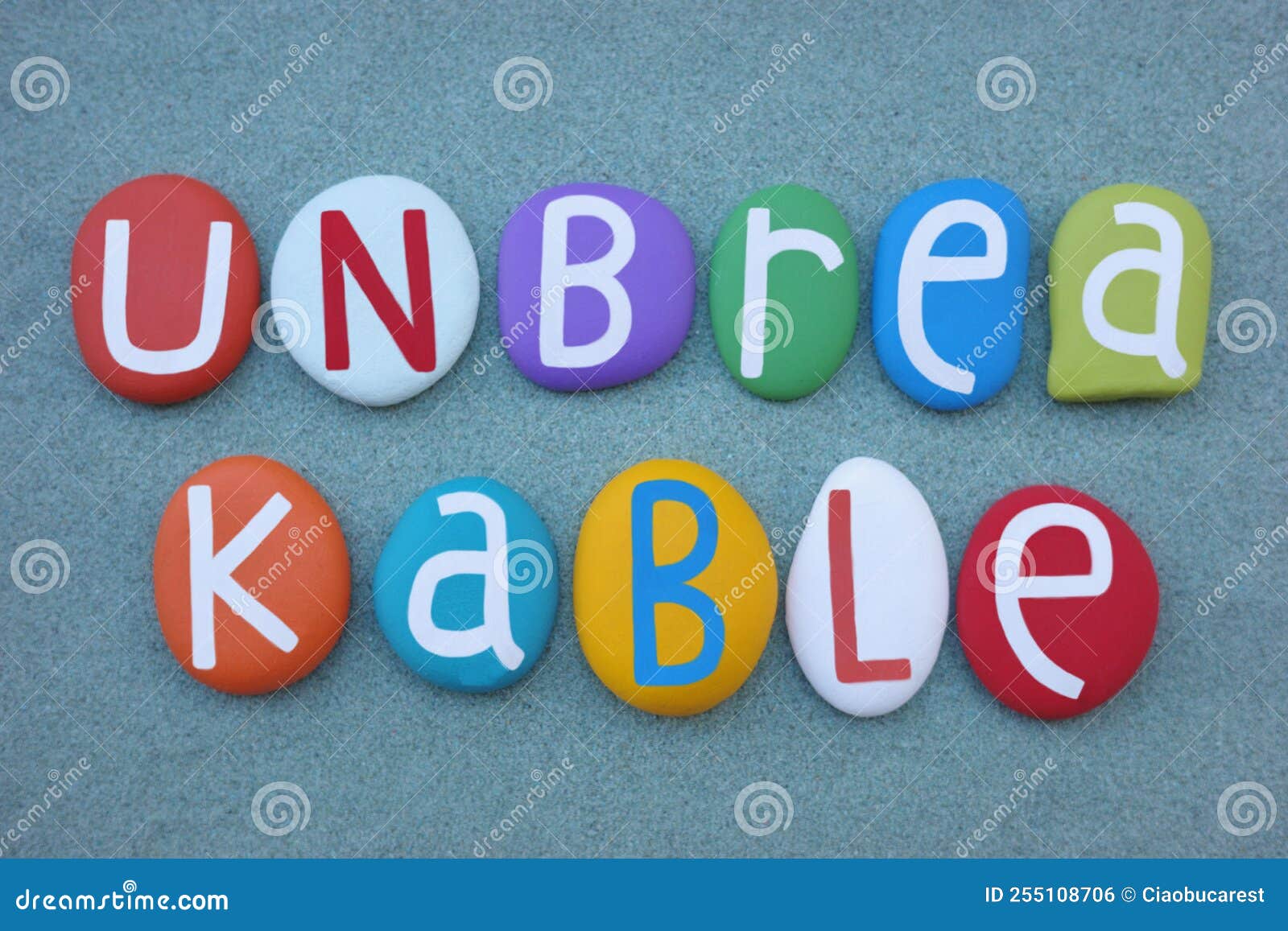Unbreakable, Creative Text Composed with Multi Colored Stone Letters ...