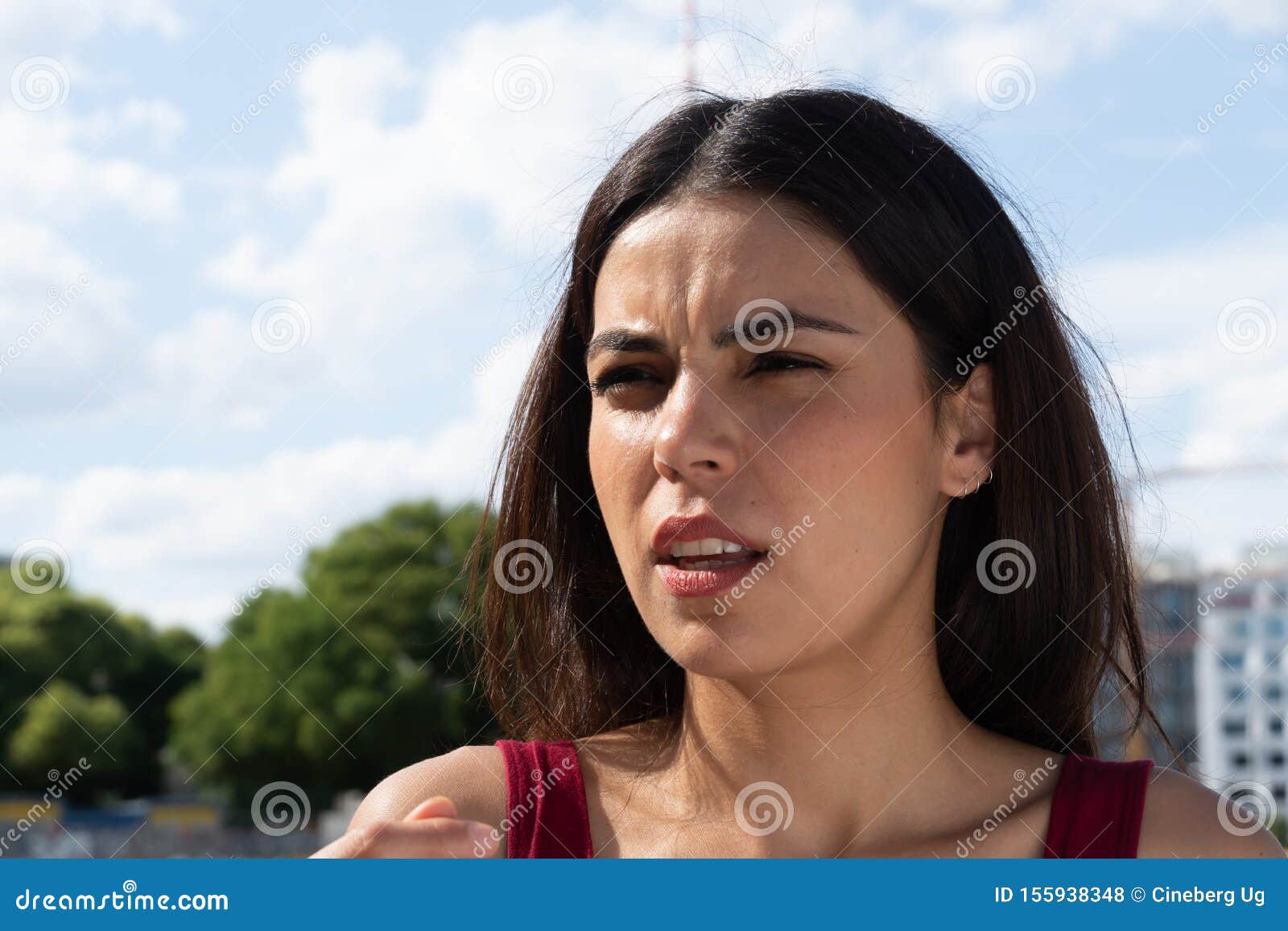 Uncertain brunette woman stock photo. Image of expression - 155938348