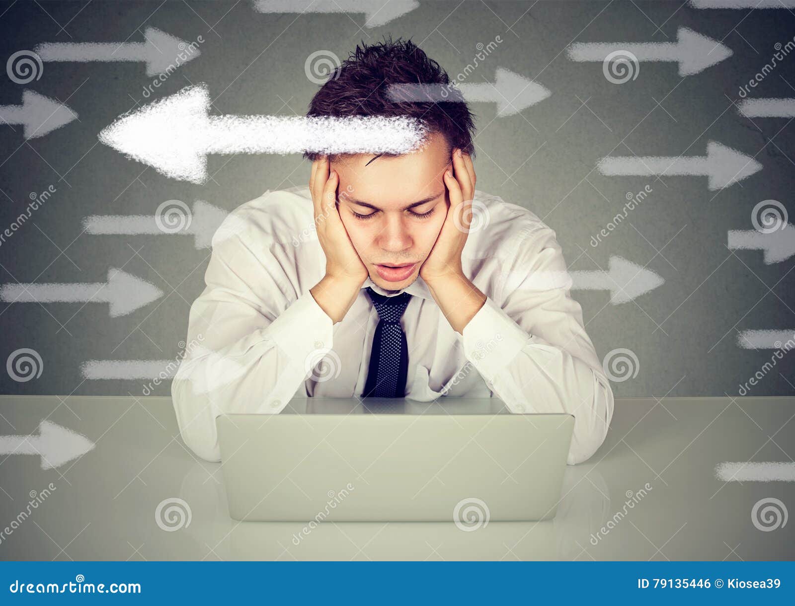 Uncertain Confused Young Man Sitting in Front of Laptop Computer Stock ...