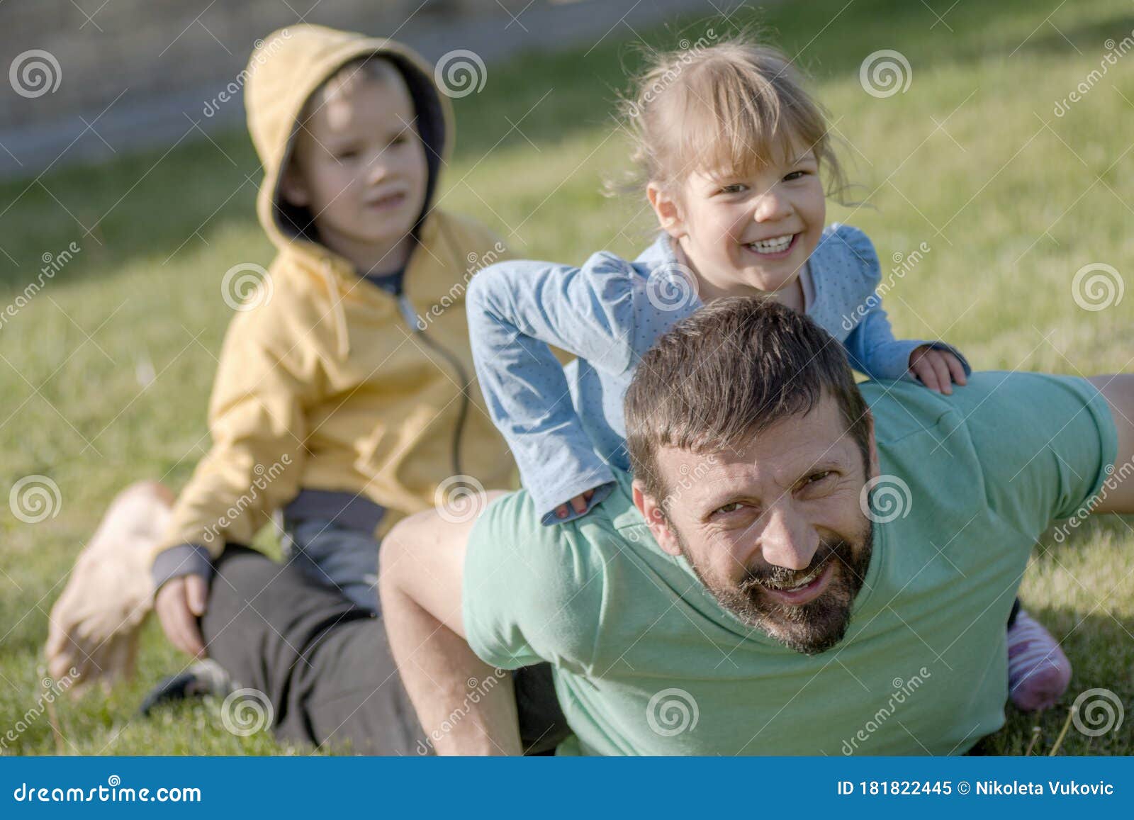 Uncle Playing with Children Stock Image - Image of leisure, grass ...