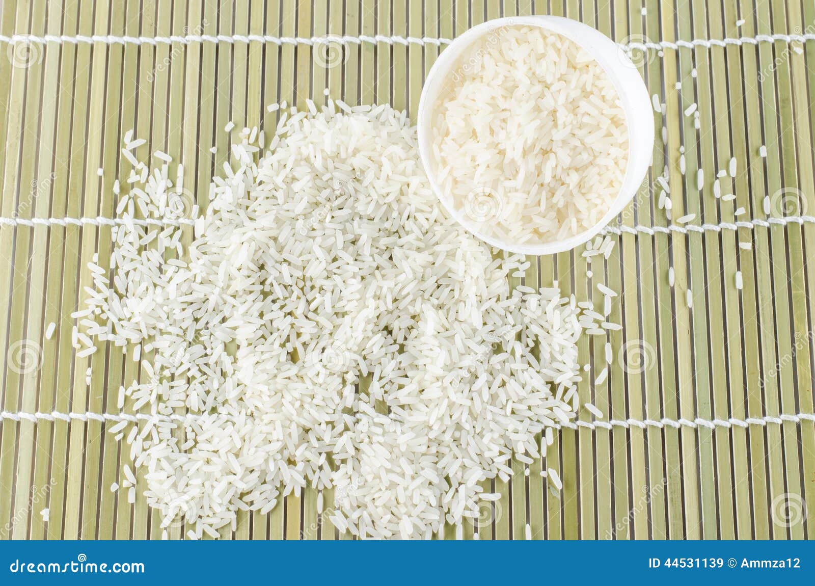 Uncook rice in mini bowl stock image. Image of ingredient - 44531139