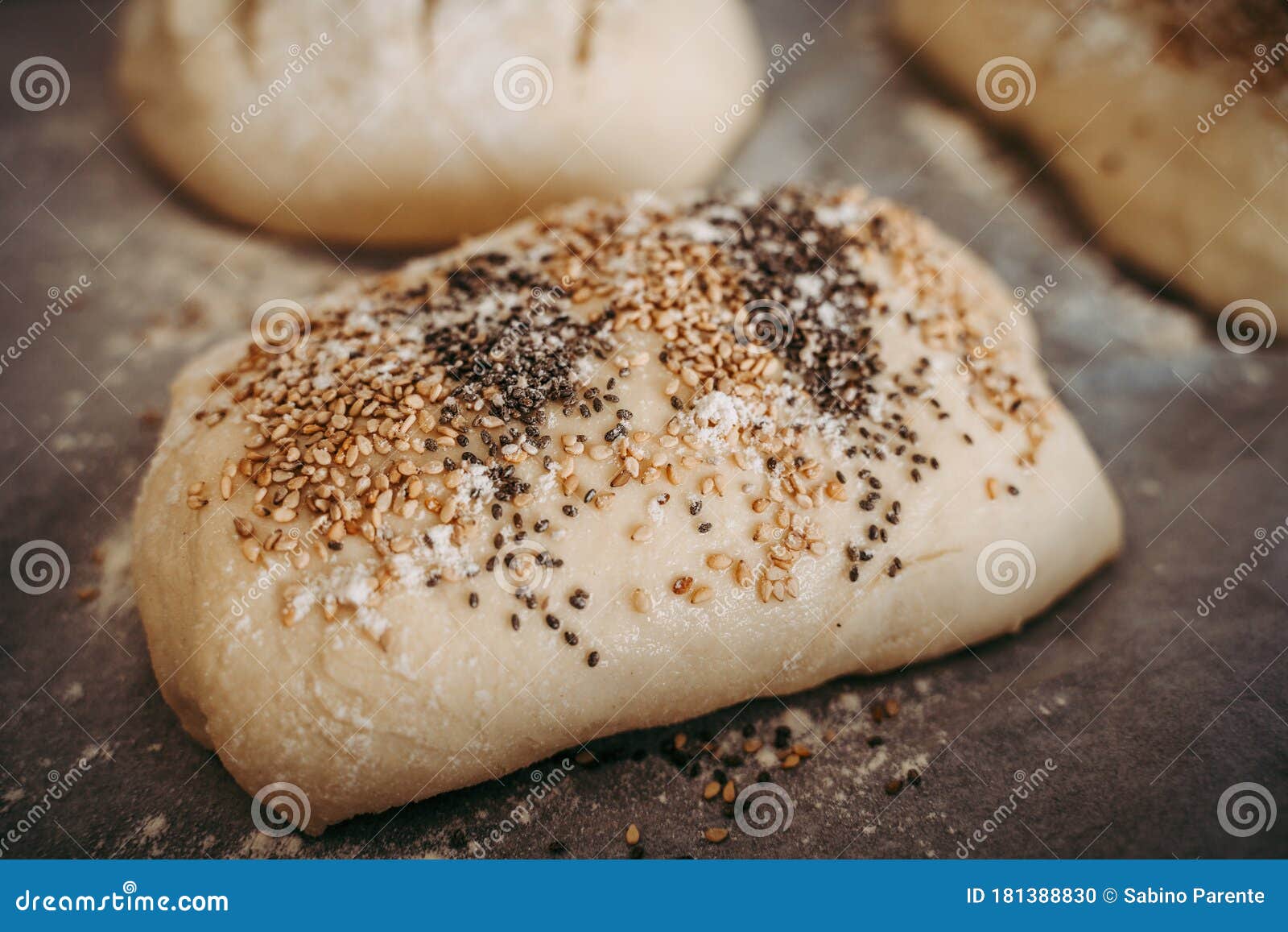 Uncooked bread with sesame stock photo. Image of food - 181388830