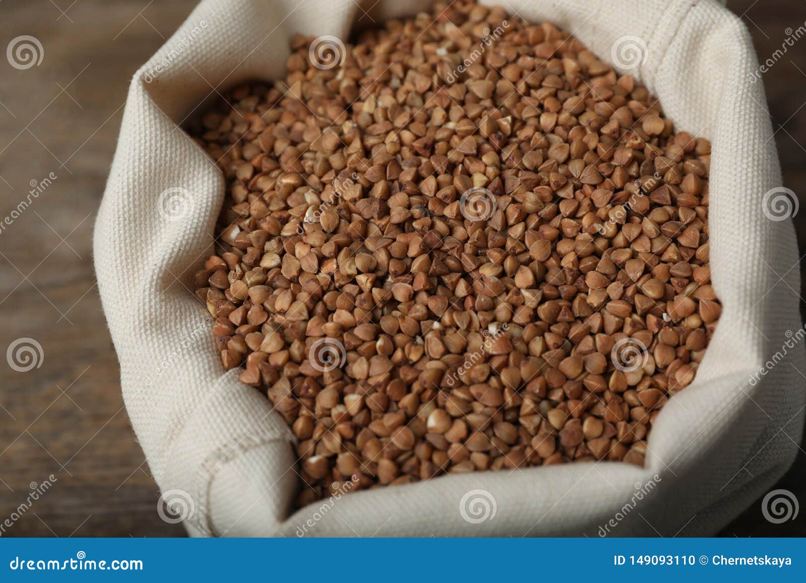 Uncooked Buckwheat in Sackcloth Bag on Table Stock Photo - Image of ...